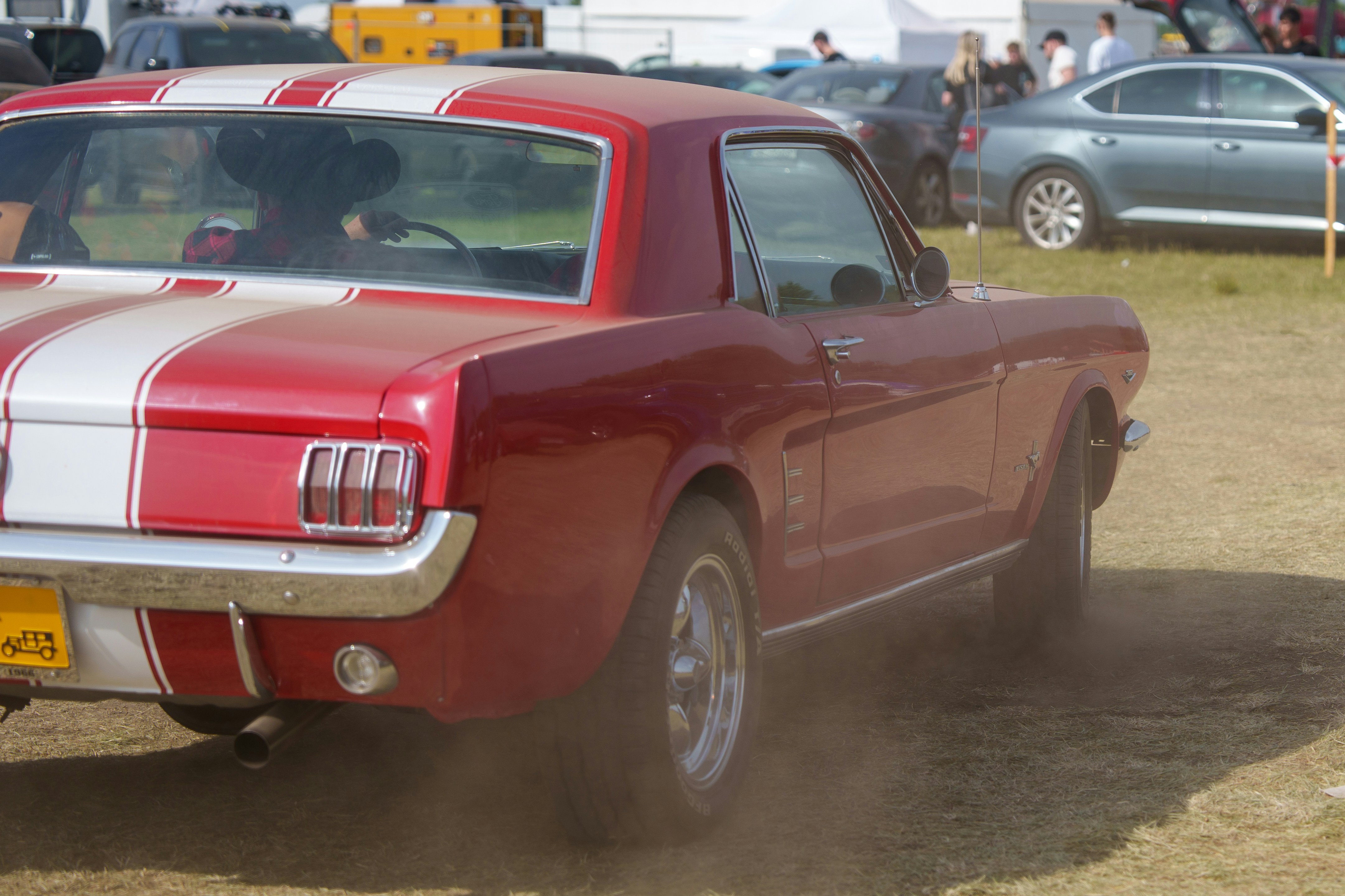 Red Muscle in the Dust: Classic Car at a Car Show