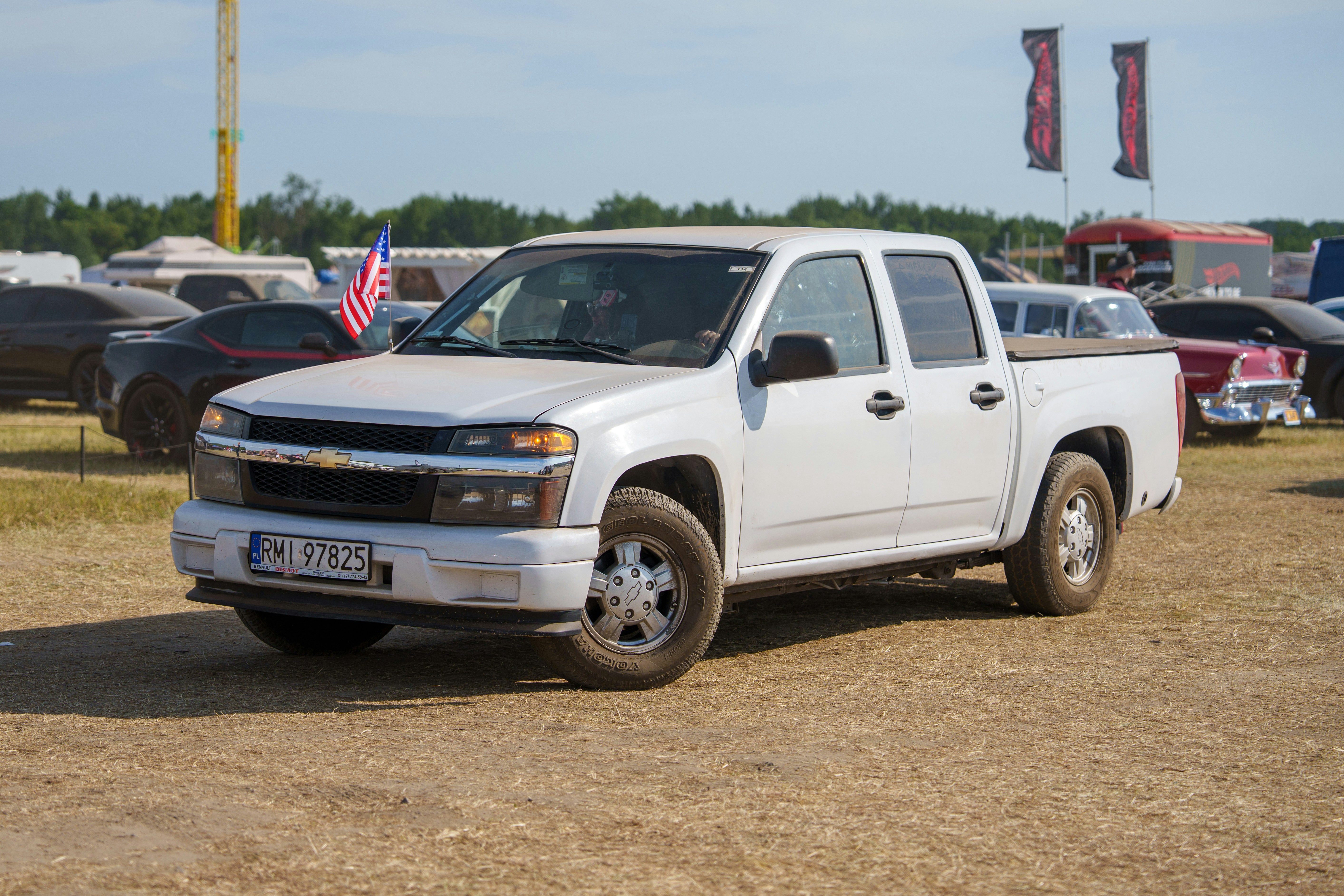 White Pickup on a Sunny Show Field