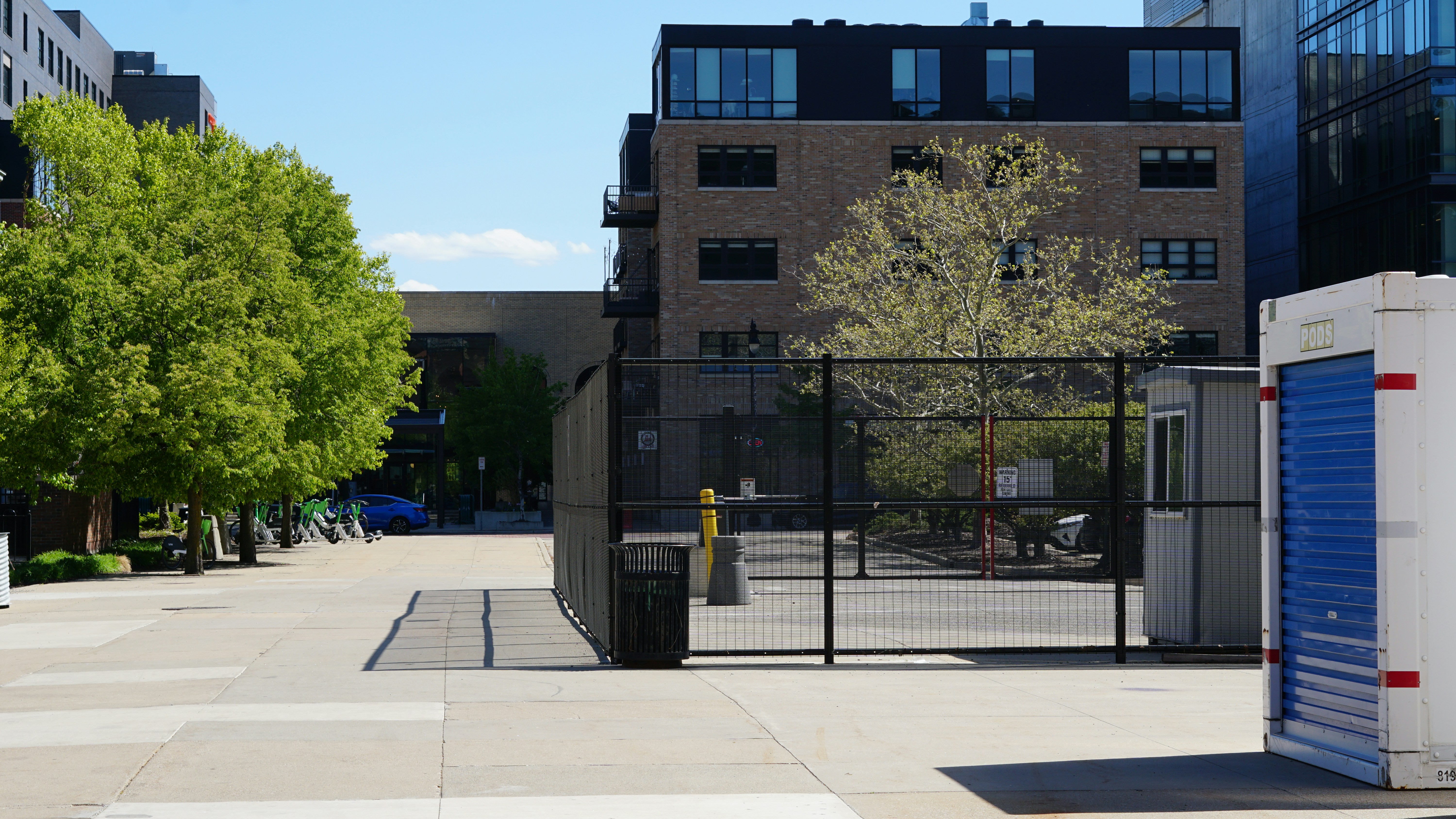 Gated Courtyard Framed by Urban Facades