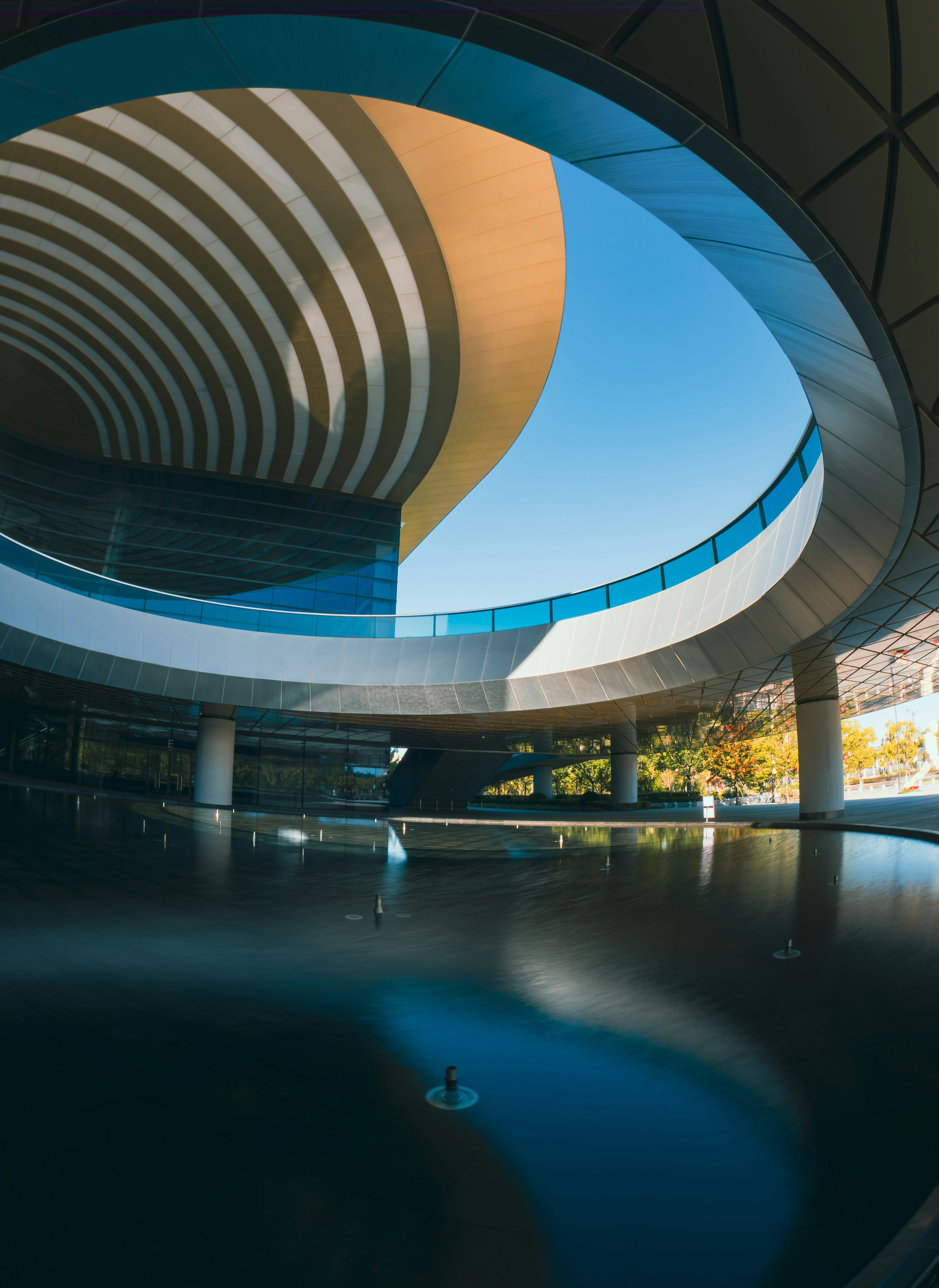 Spiral Atrium: A Cascade of Circles and Glass