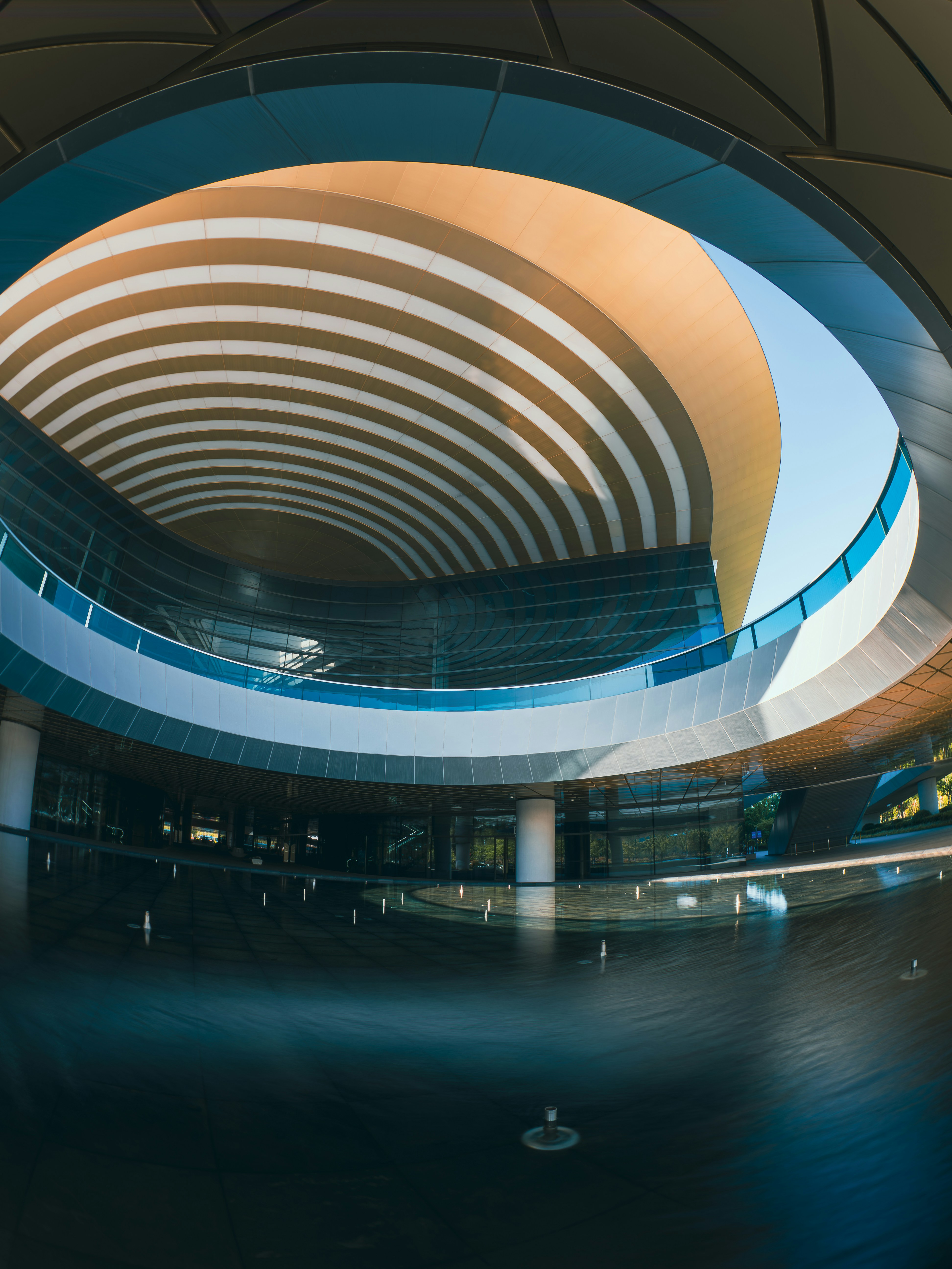 Spiraling Atrium: A Modern Circular Void Reimagined