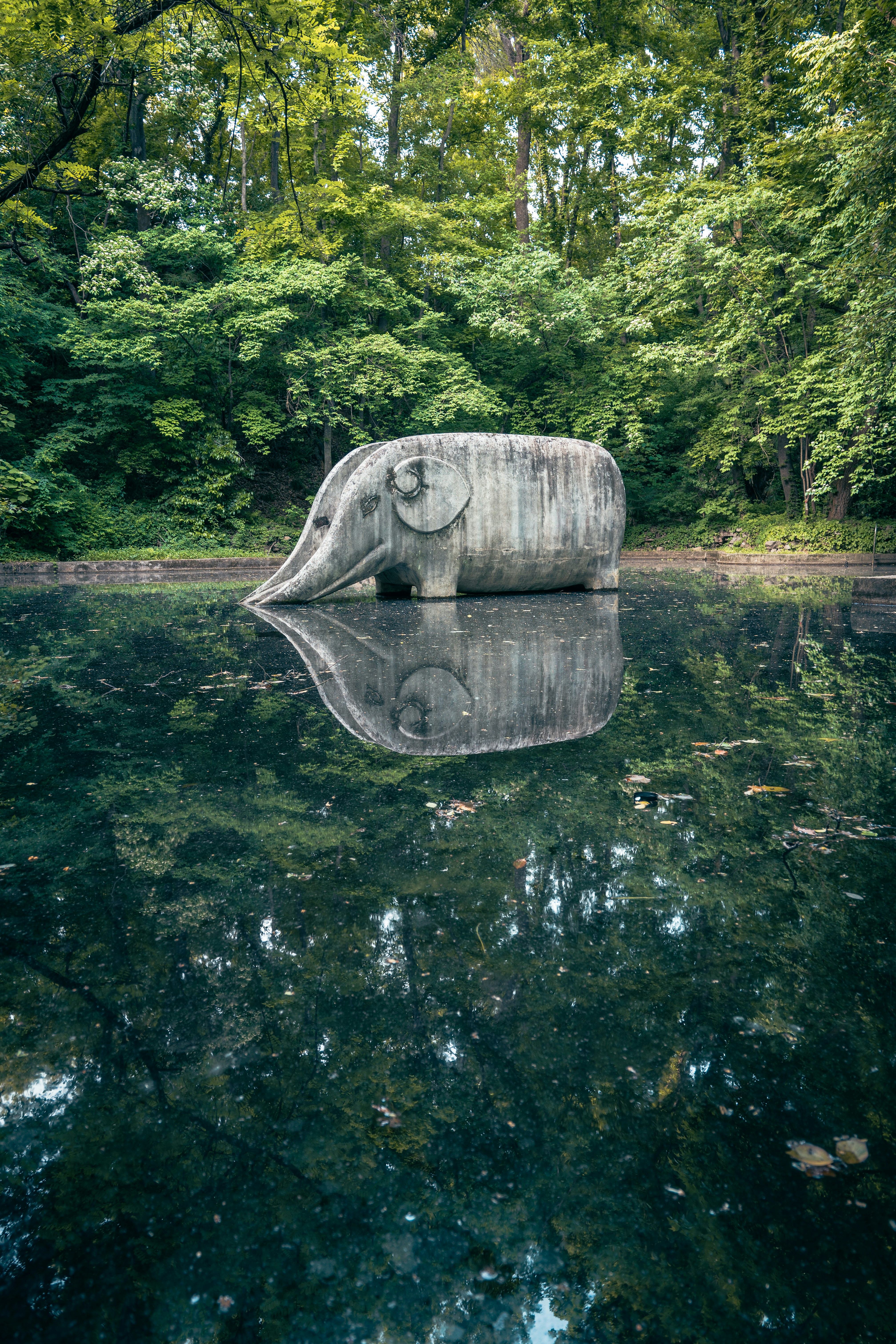 Echo of the Forest: A Concrete Mammoth with a Glassy Smile