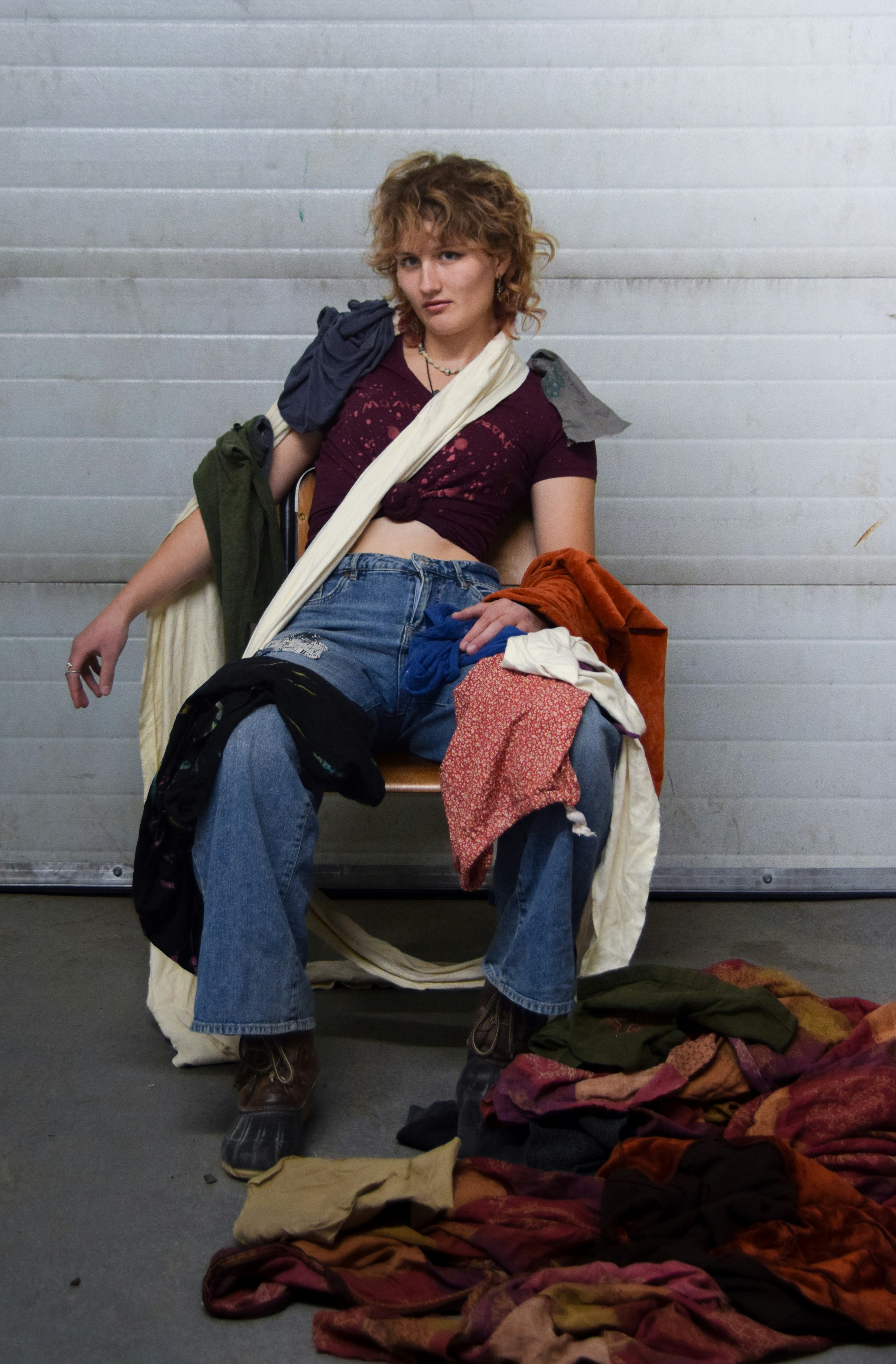Layered Quiet Rebel in a Studio of Colorful Clothes