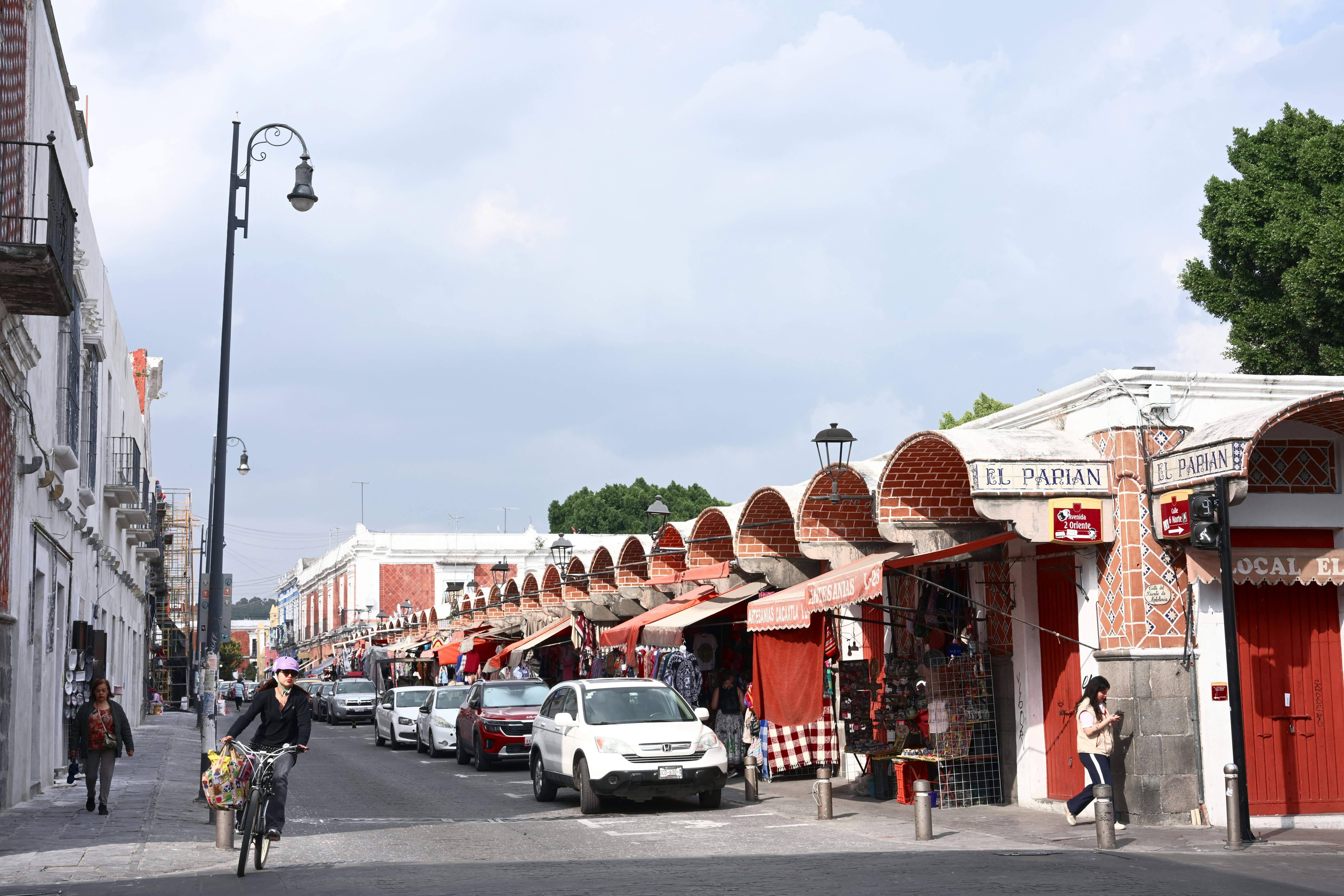 Market Street Corridor: Arched Shopfronts Framing a Quiet Boulevard