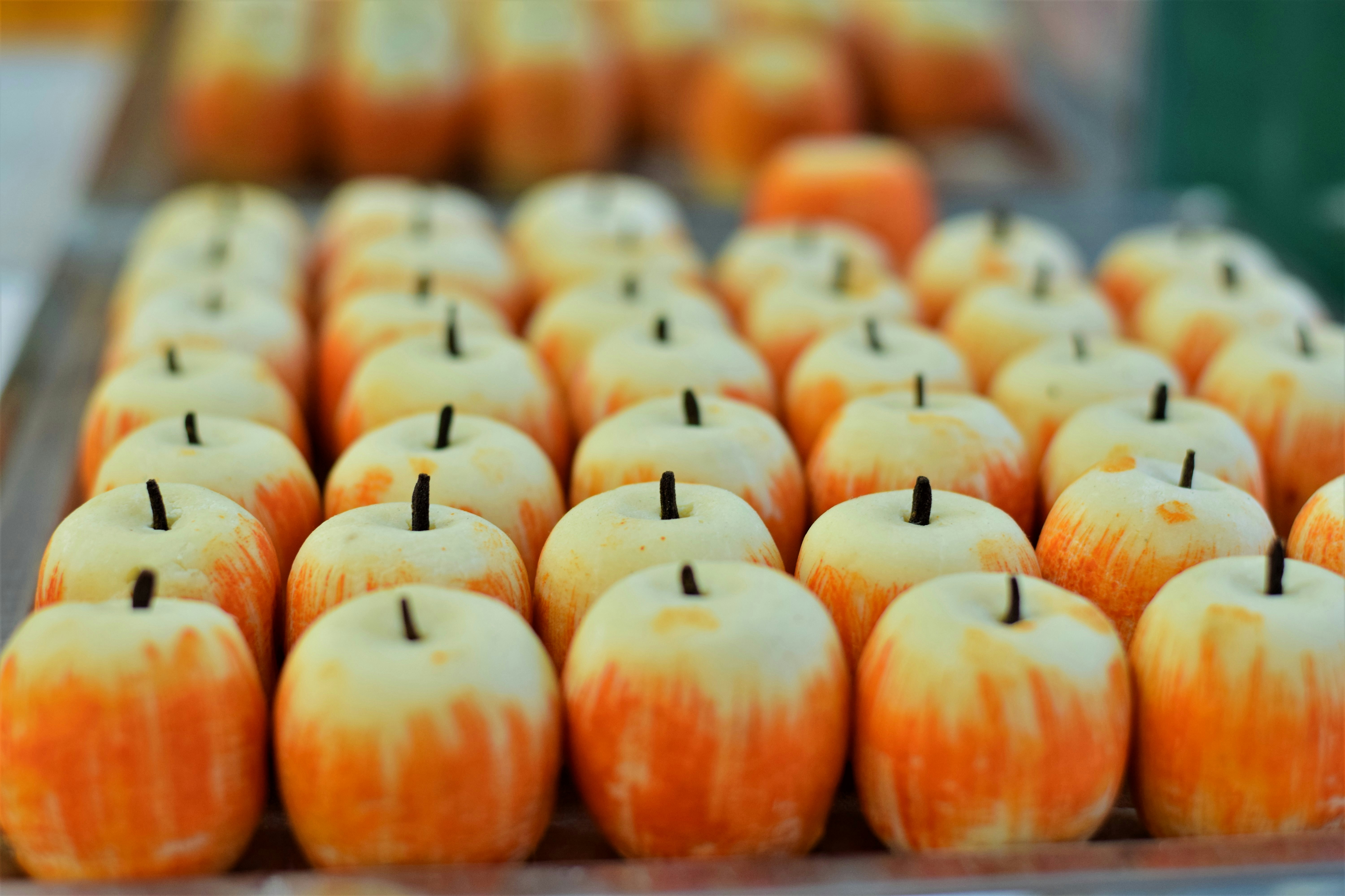 Rows of Velvet Apples: A Blurred Field of Orchard Candy