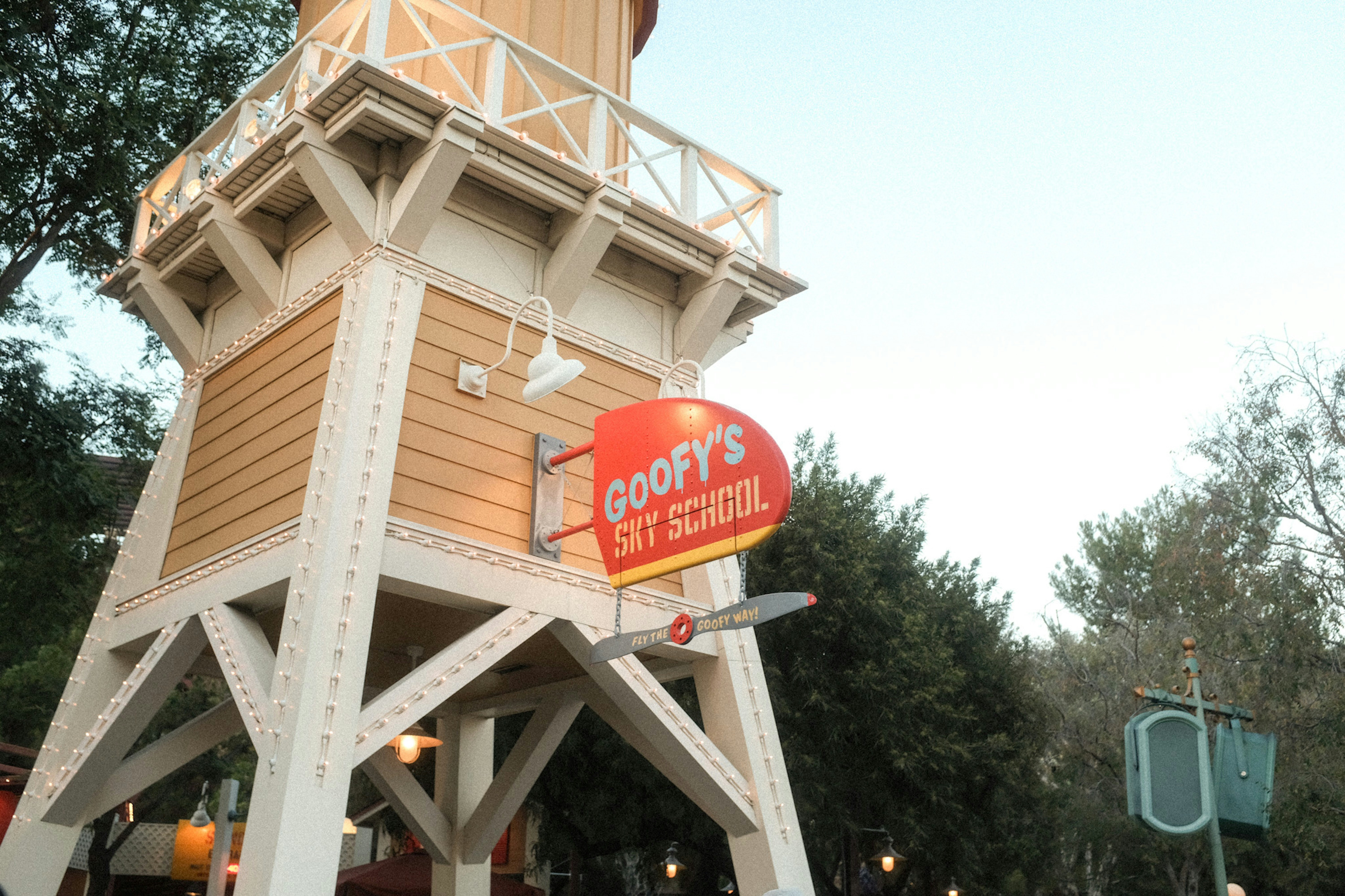 Goofy’s Sky-High Stand: A Towering Sign Above the Amble