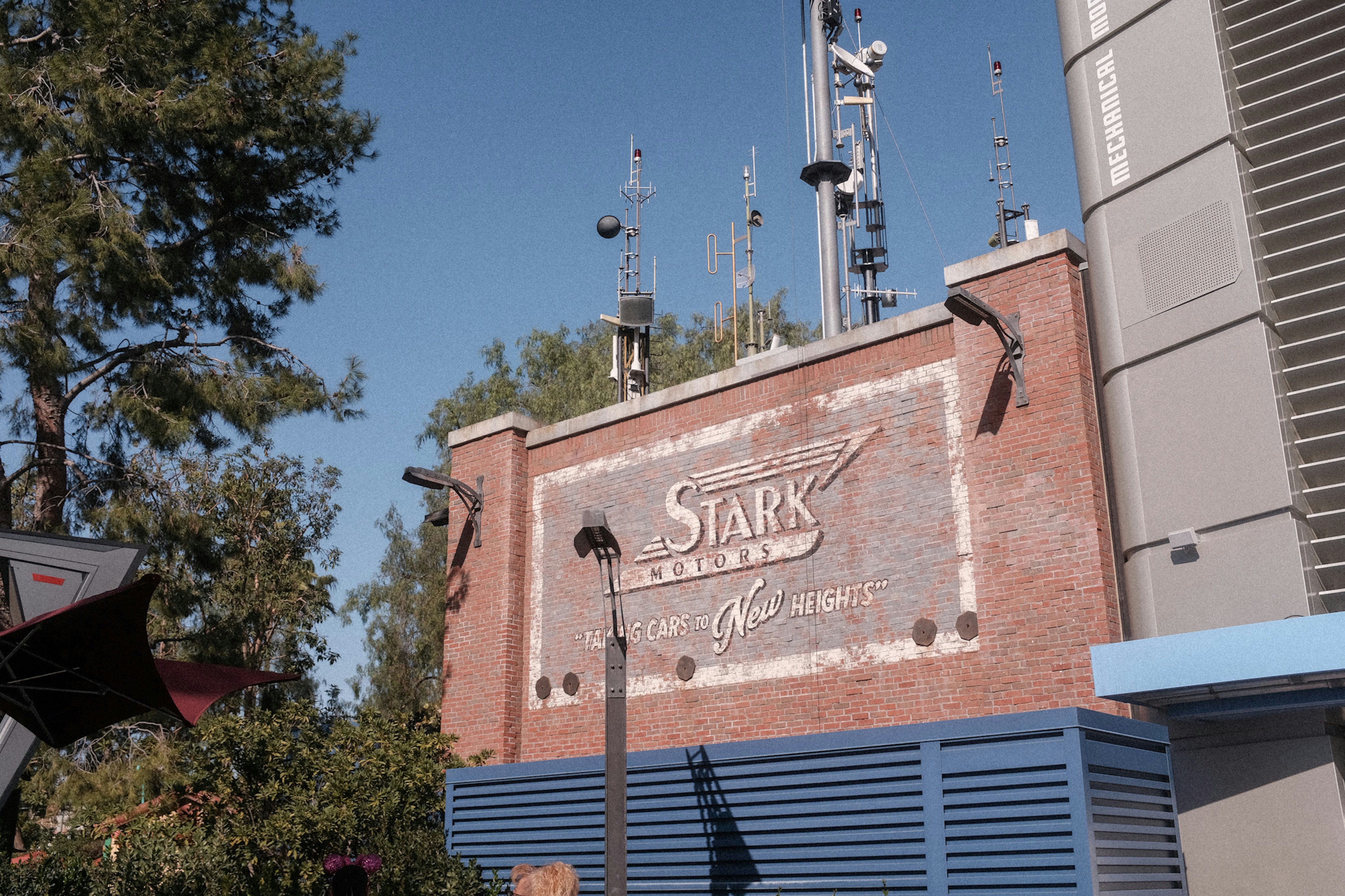 Brick Stark Signage on a Factory-Style Building under Clear Sky