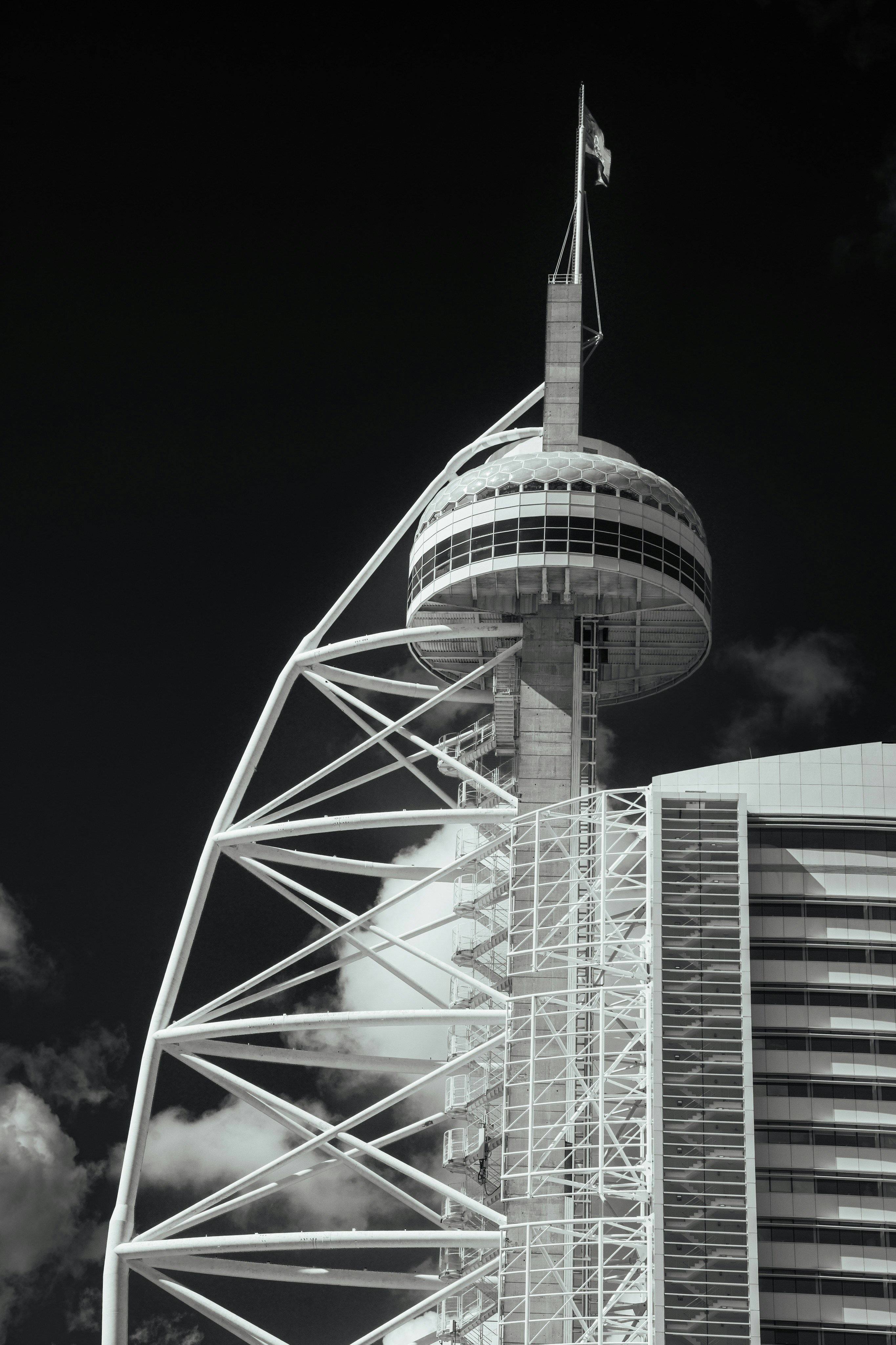 Circle of Steel: The Orbiting Tower in Monochrome