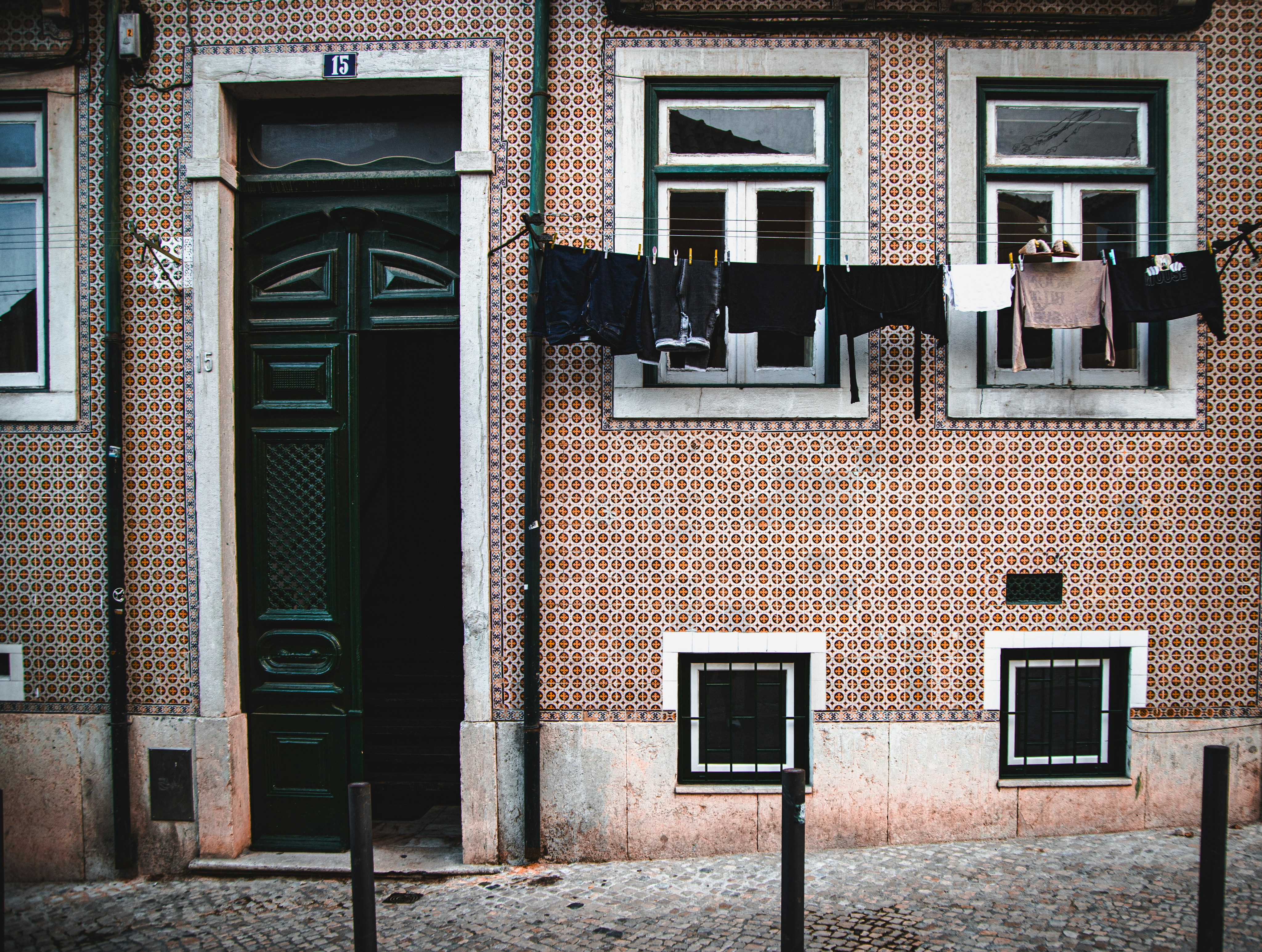 Laundry Lines Across a Portuguese Facade