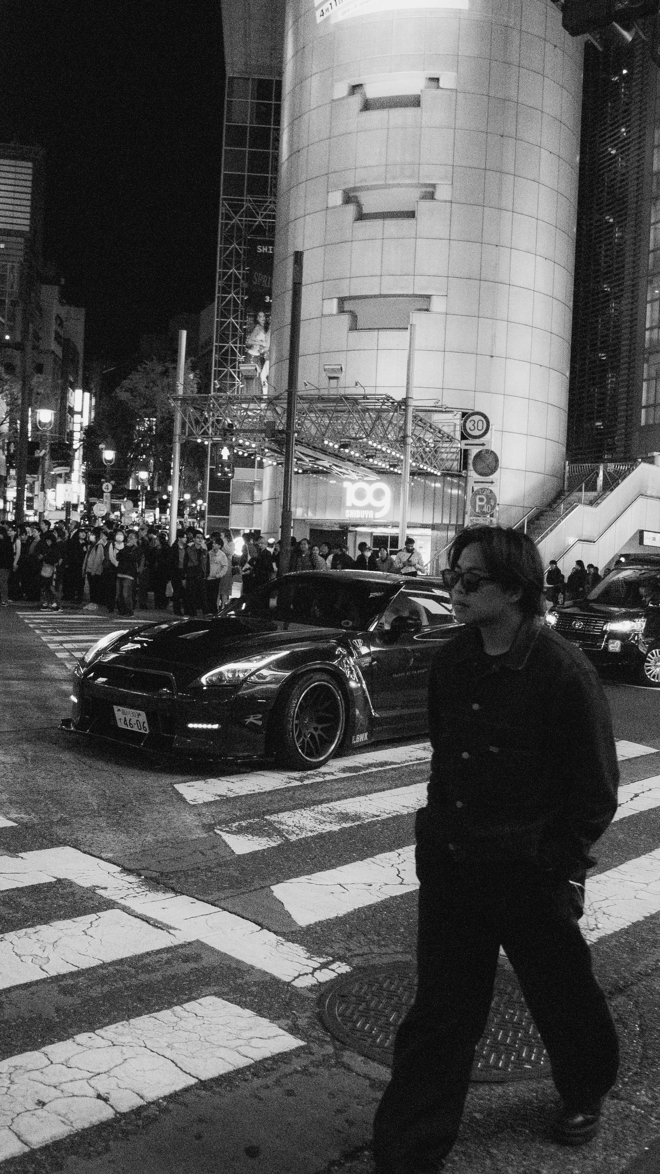 Neon Runway: Nightlife Street in Motion