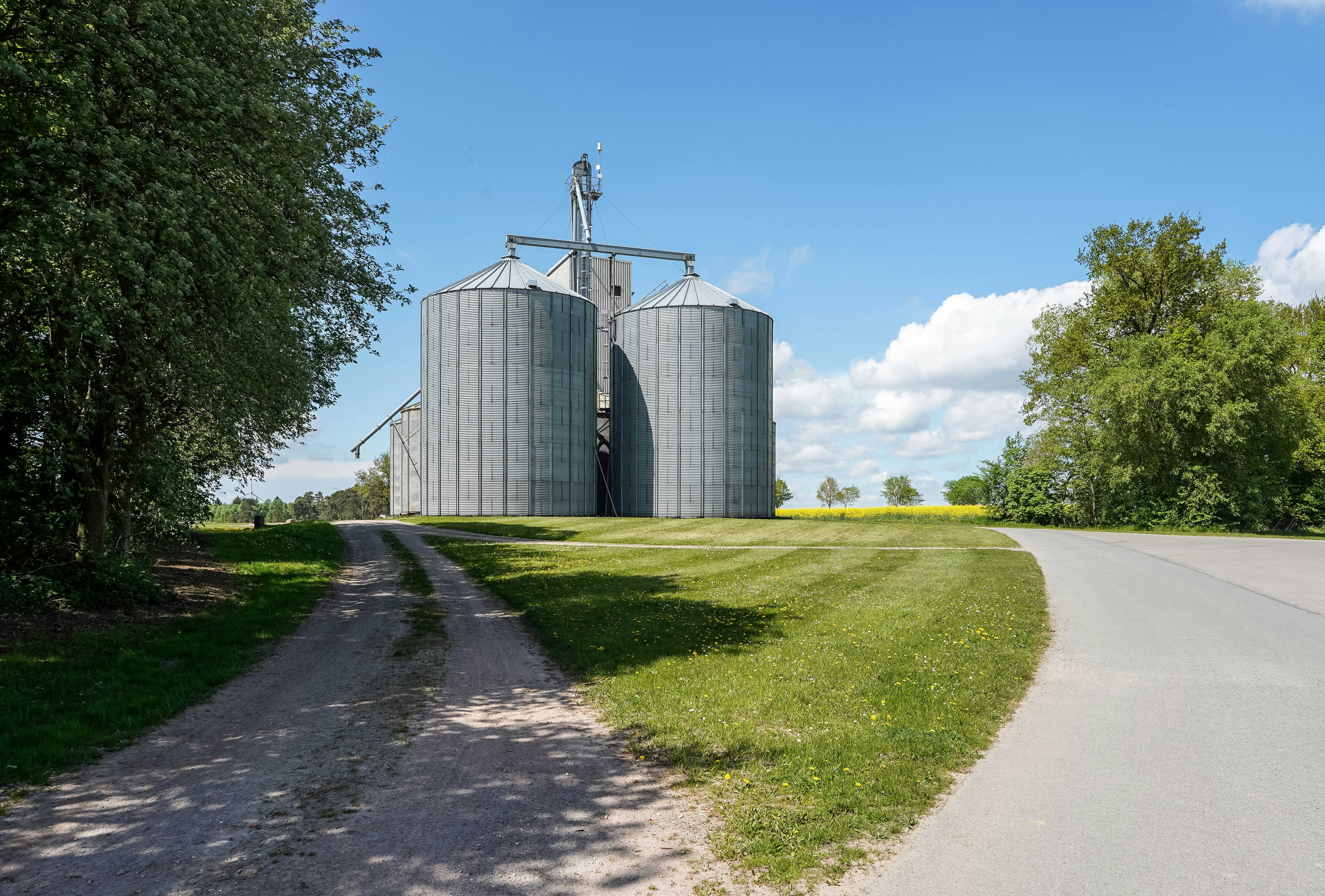 Grain Silos and Open Road Horizon