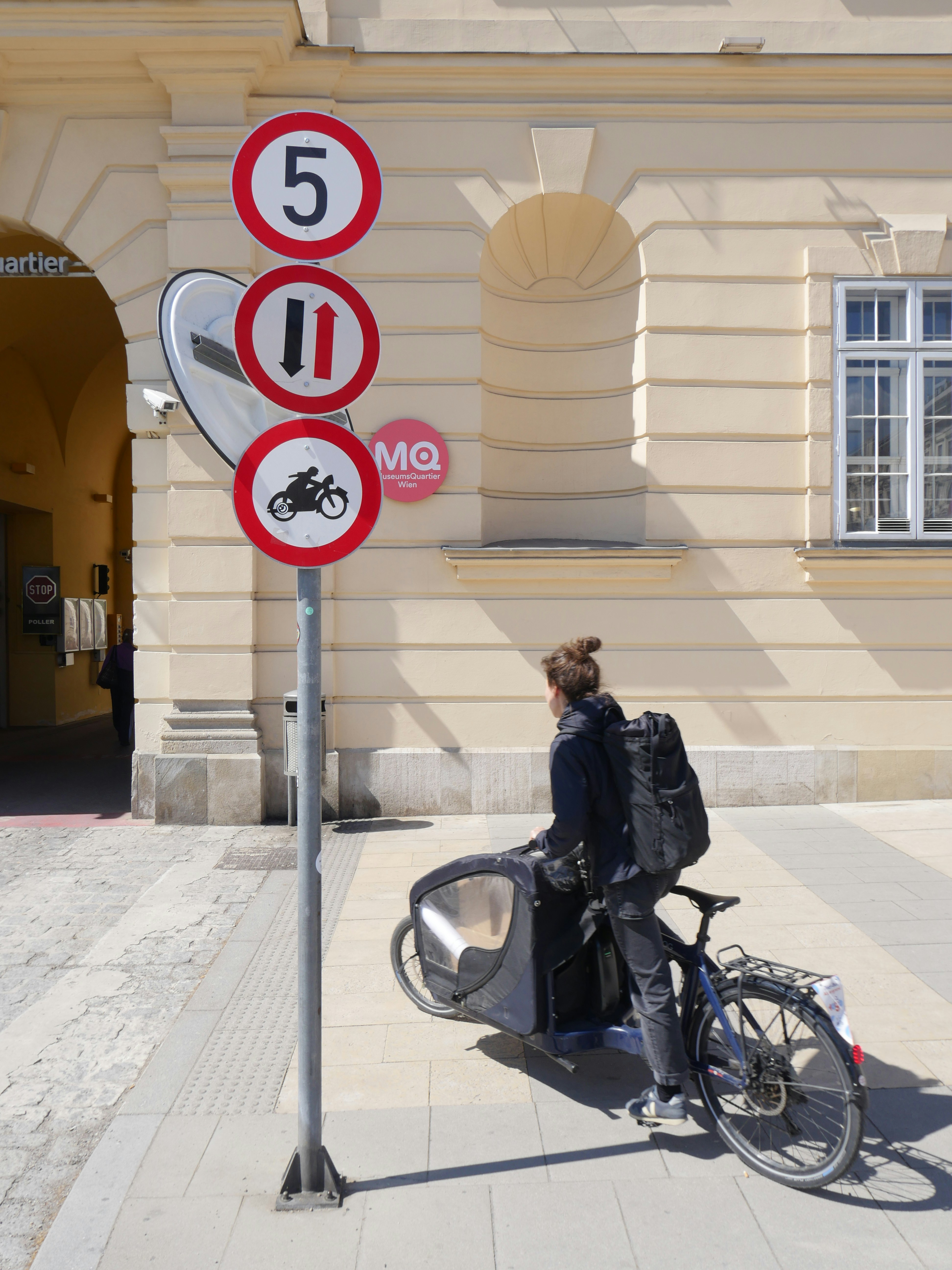 Pedicab Pause at a Sunlit European Street