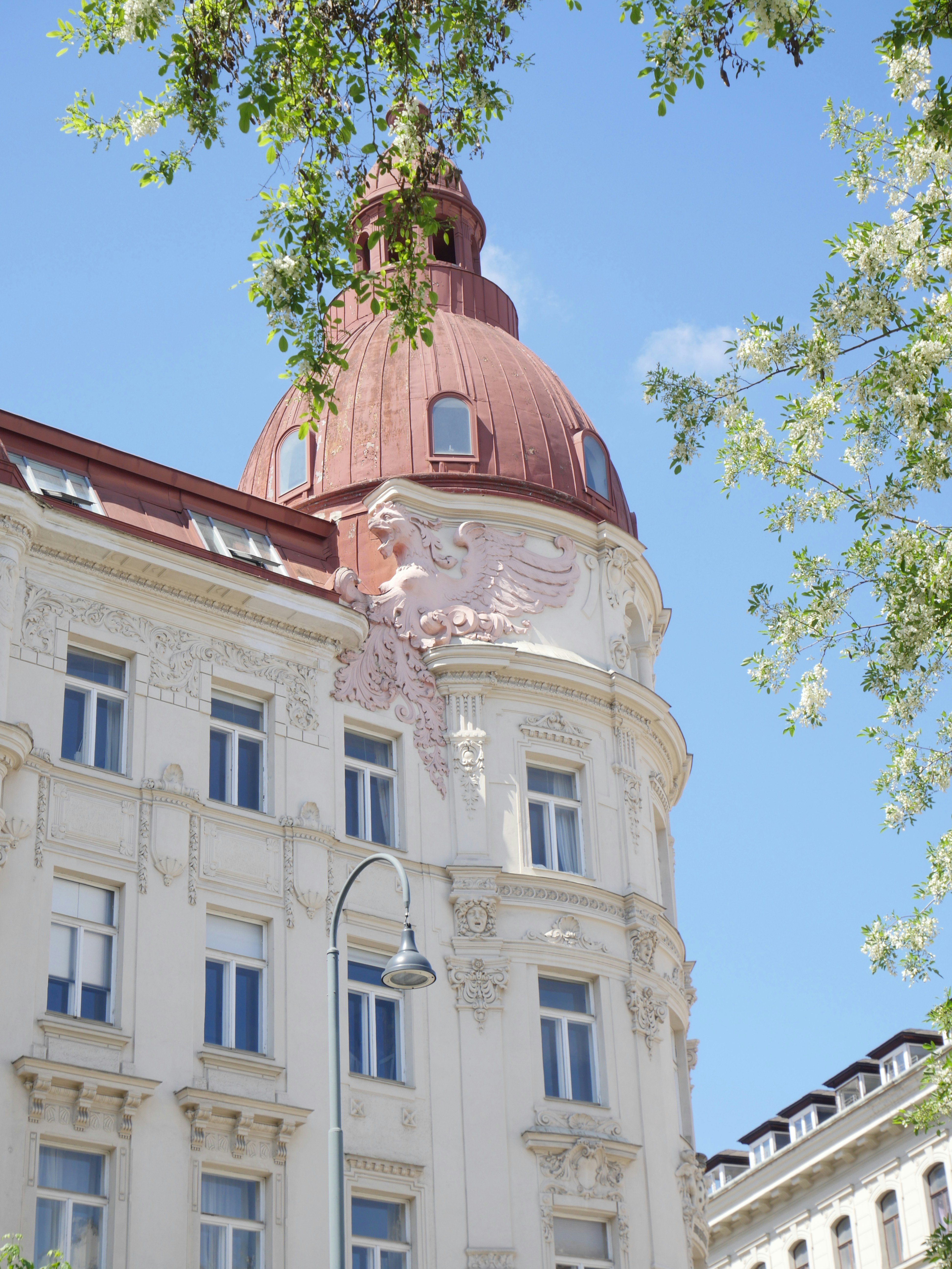 Dome of a Historic White Facade Bathed in Summer Light