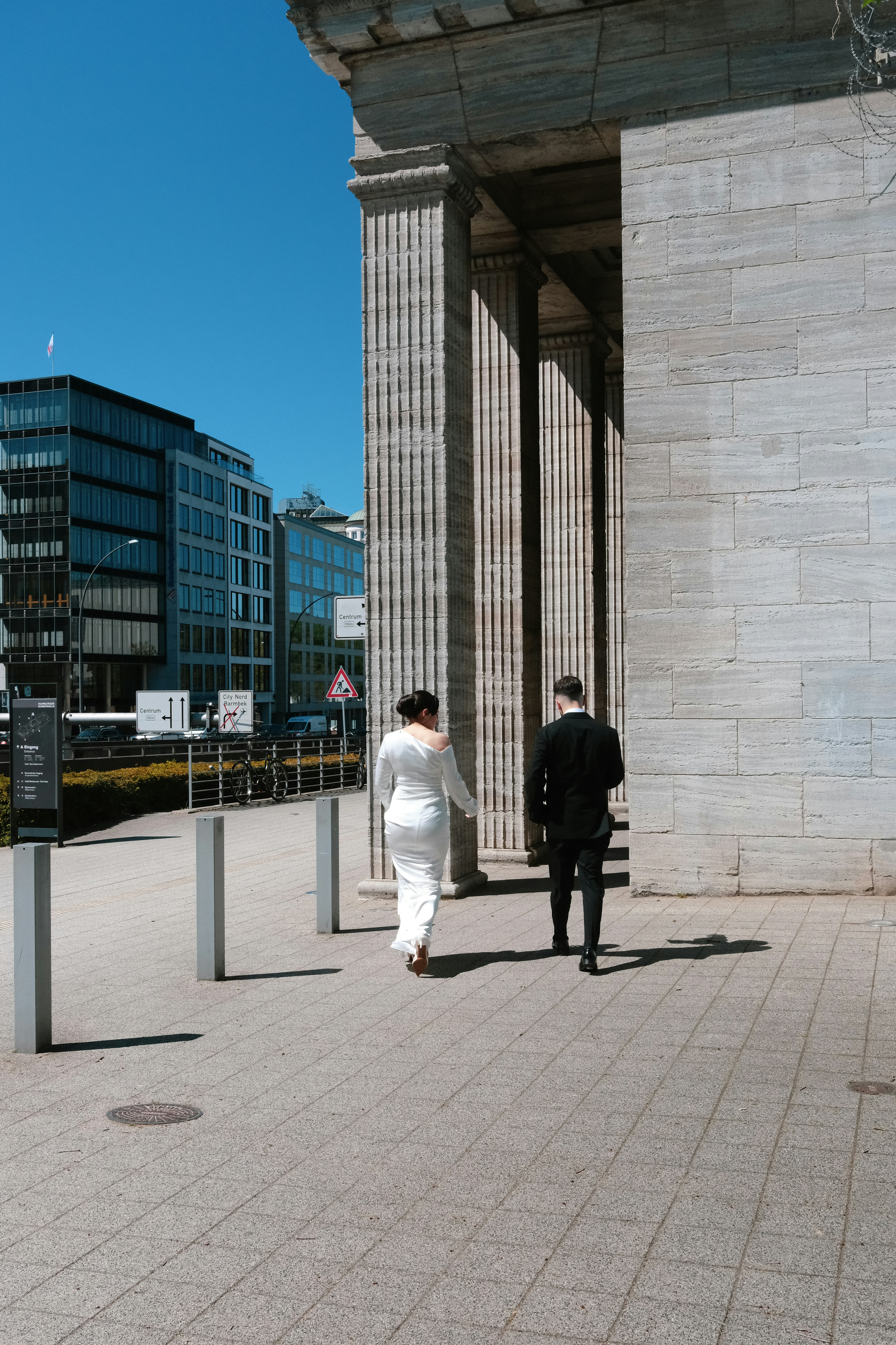 A Quiet Walk Under Monumental Columns
