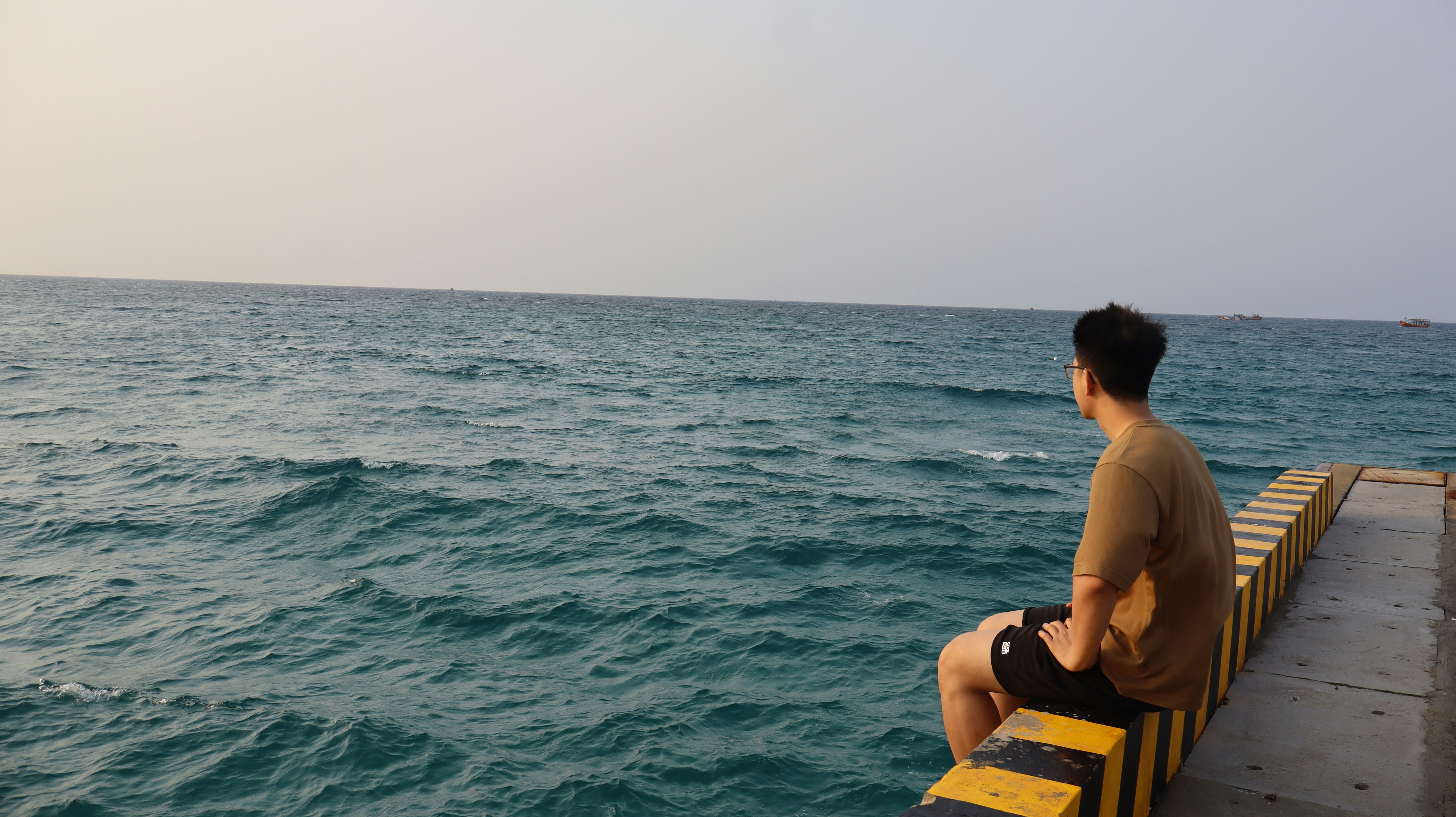 Horizon Gazer at the End of the Pier