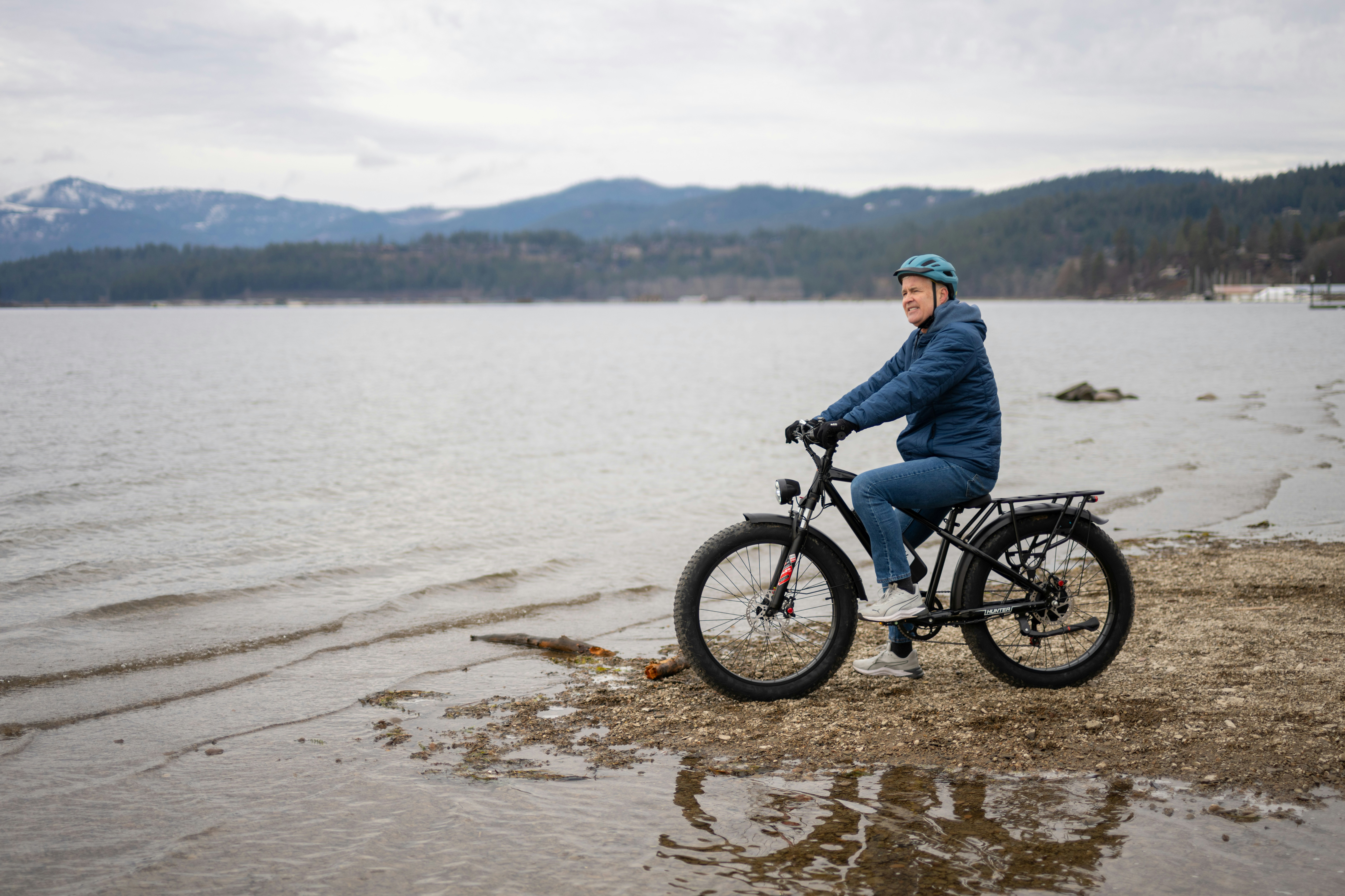 Cyclist by the Lake: Quiet Confidence on a Shored Edge