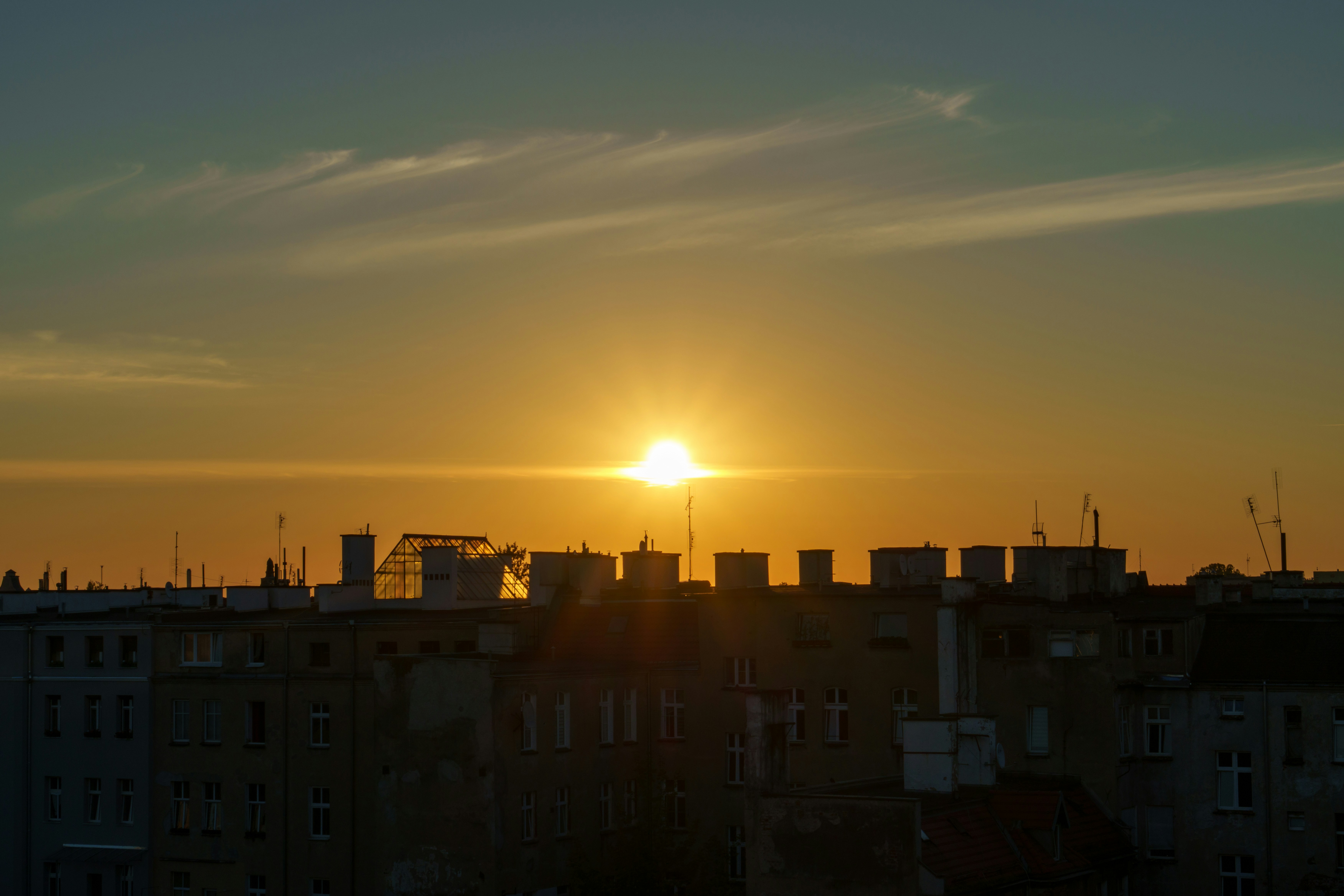 City at Sunset: A Quiet Horizon Beneath a Low Sun