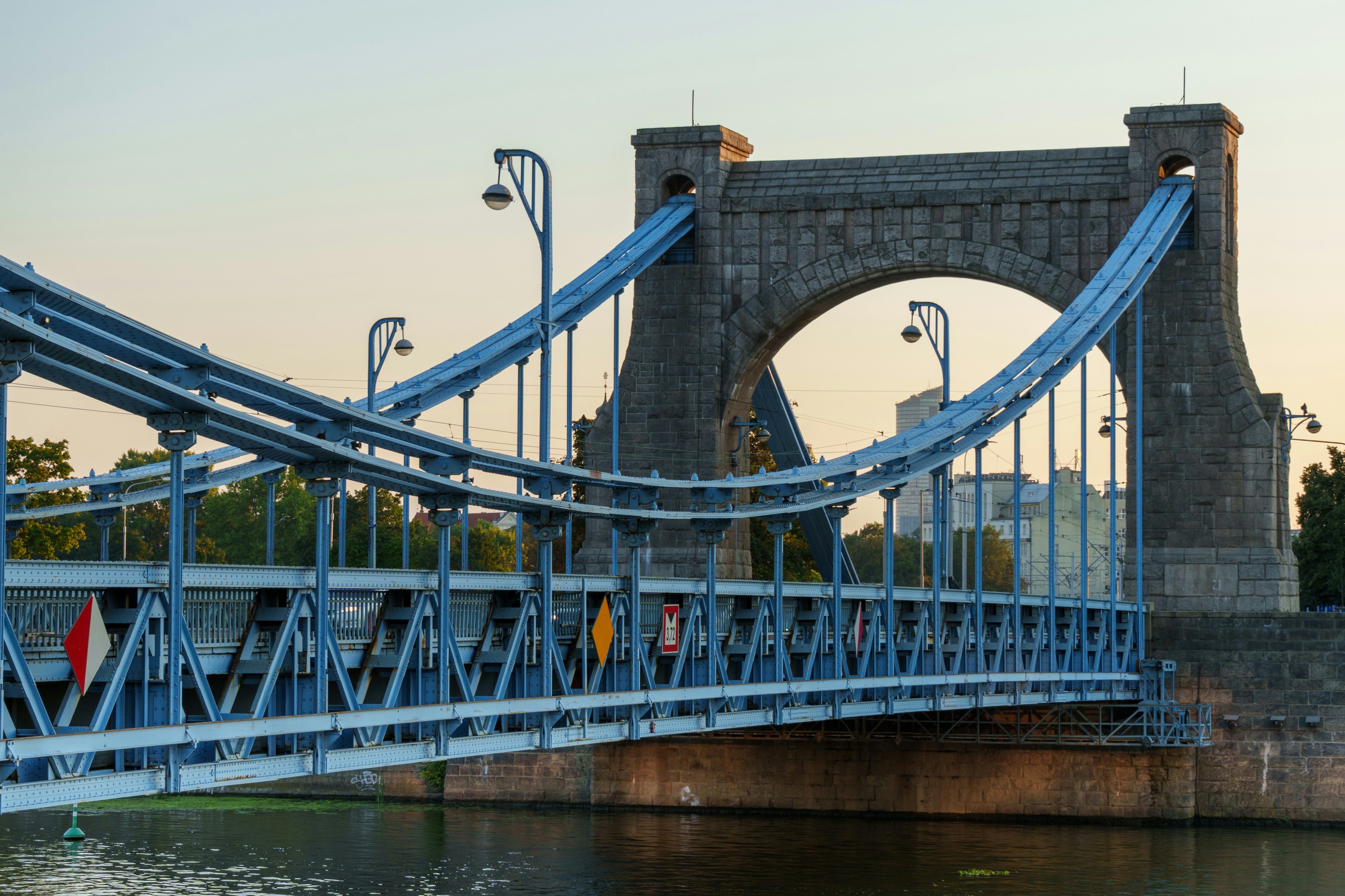 Blue Suspension: A Sunlit Walk Across the Arch