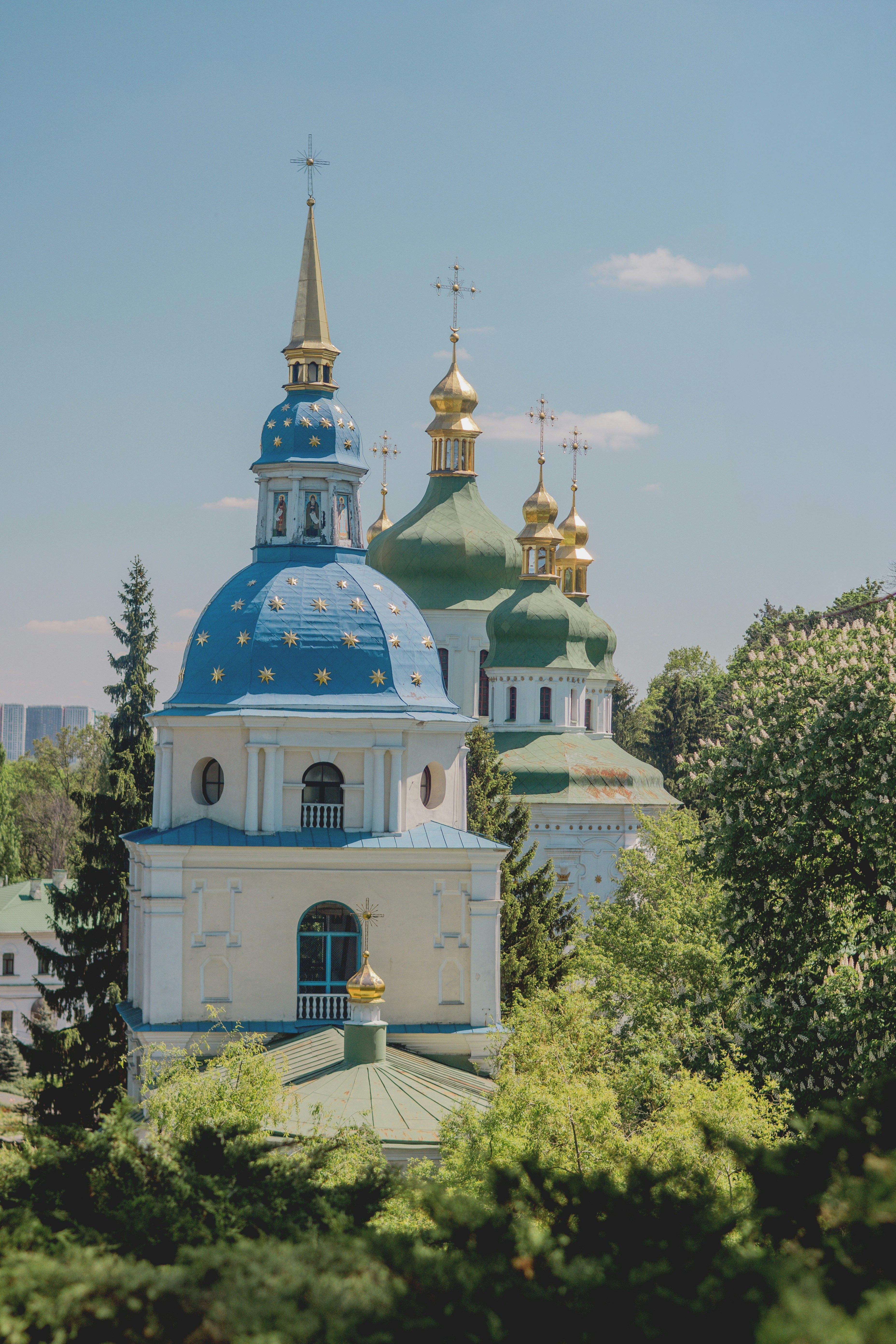 Blue Dome on Green Domes: A Cathedral amid Spring Foliage