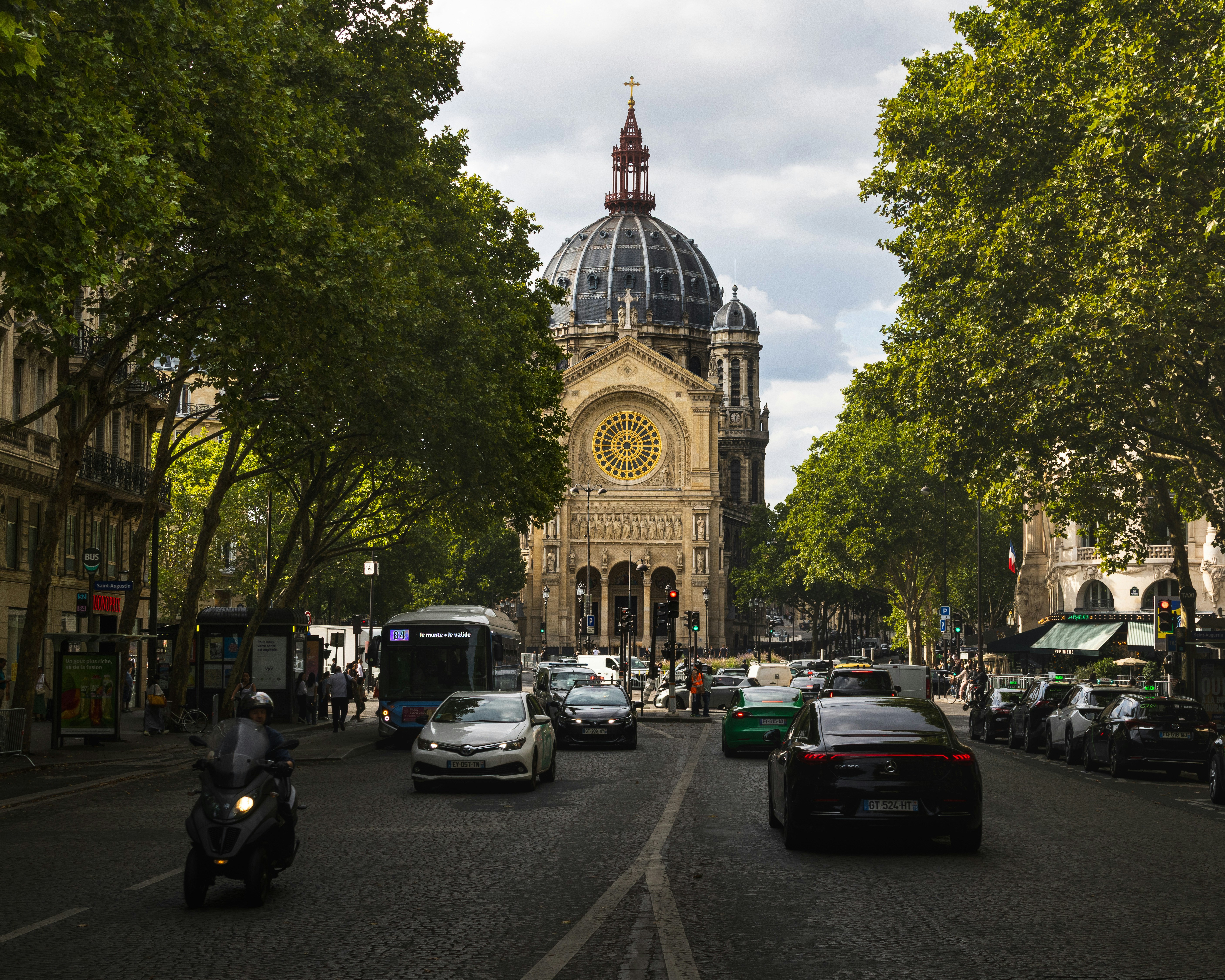 City Cathedral Through a River of Traffic