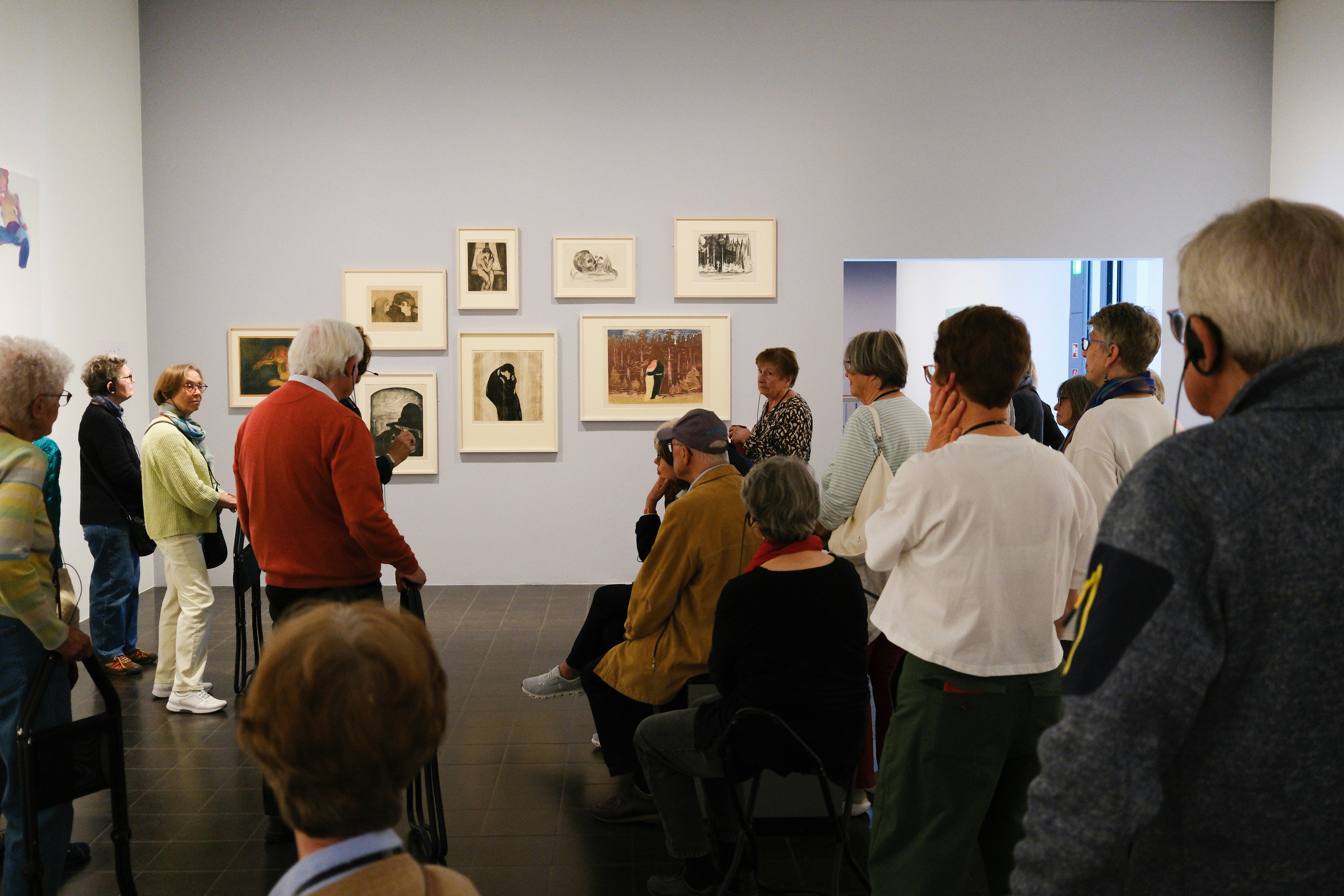 Gathered Voices: Visitors in a Small Art Gallery
