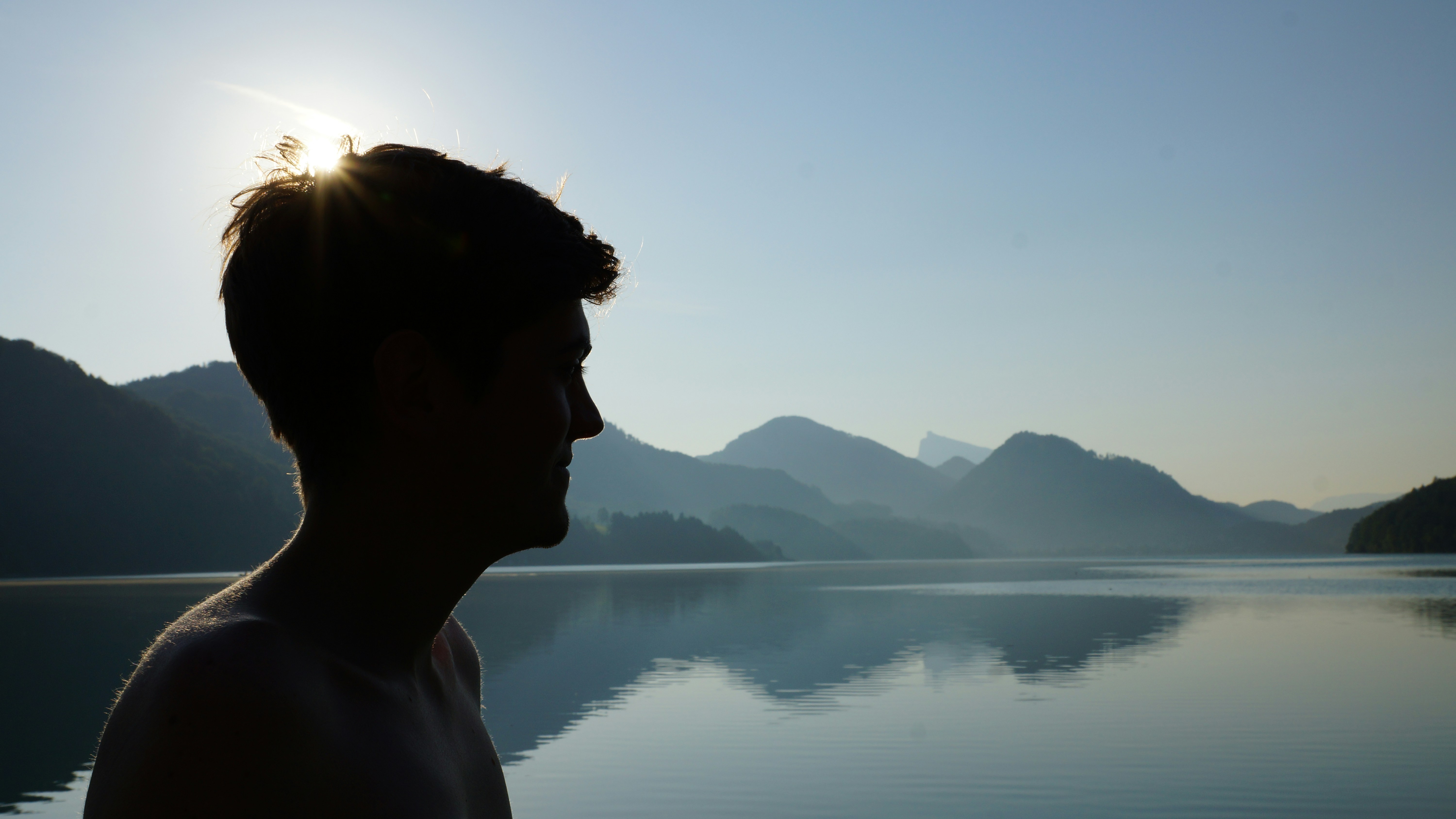 Silhouette at Dusk: A Quiet Portrait by the Lake