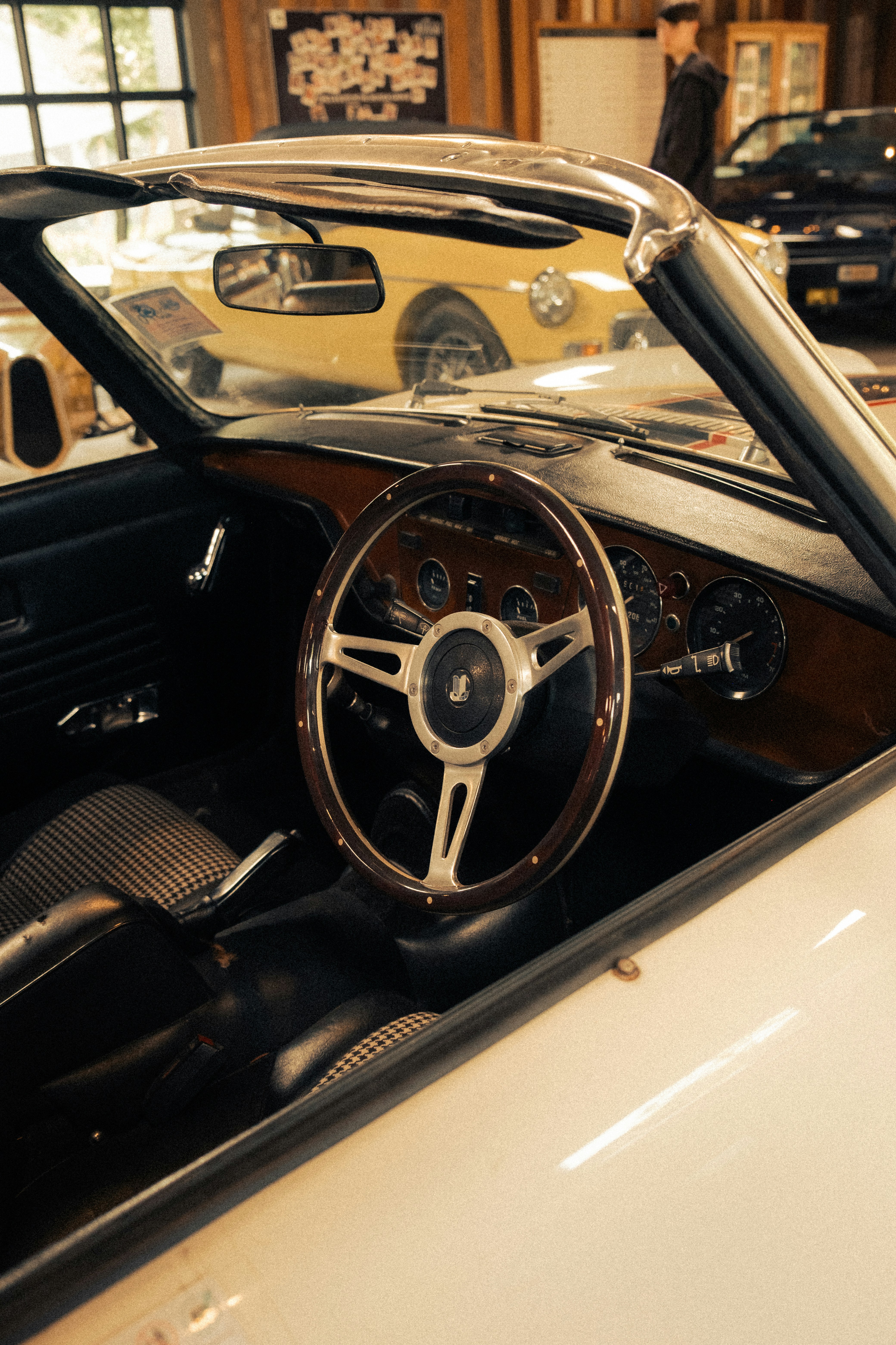 Wooden Dash and Classic Steering: A Glimpse Inside a Vintage Steering Wheel