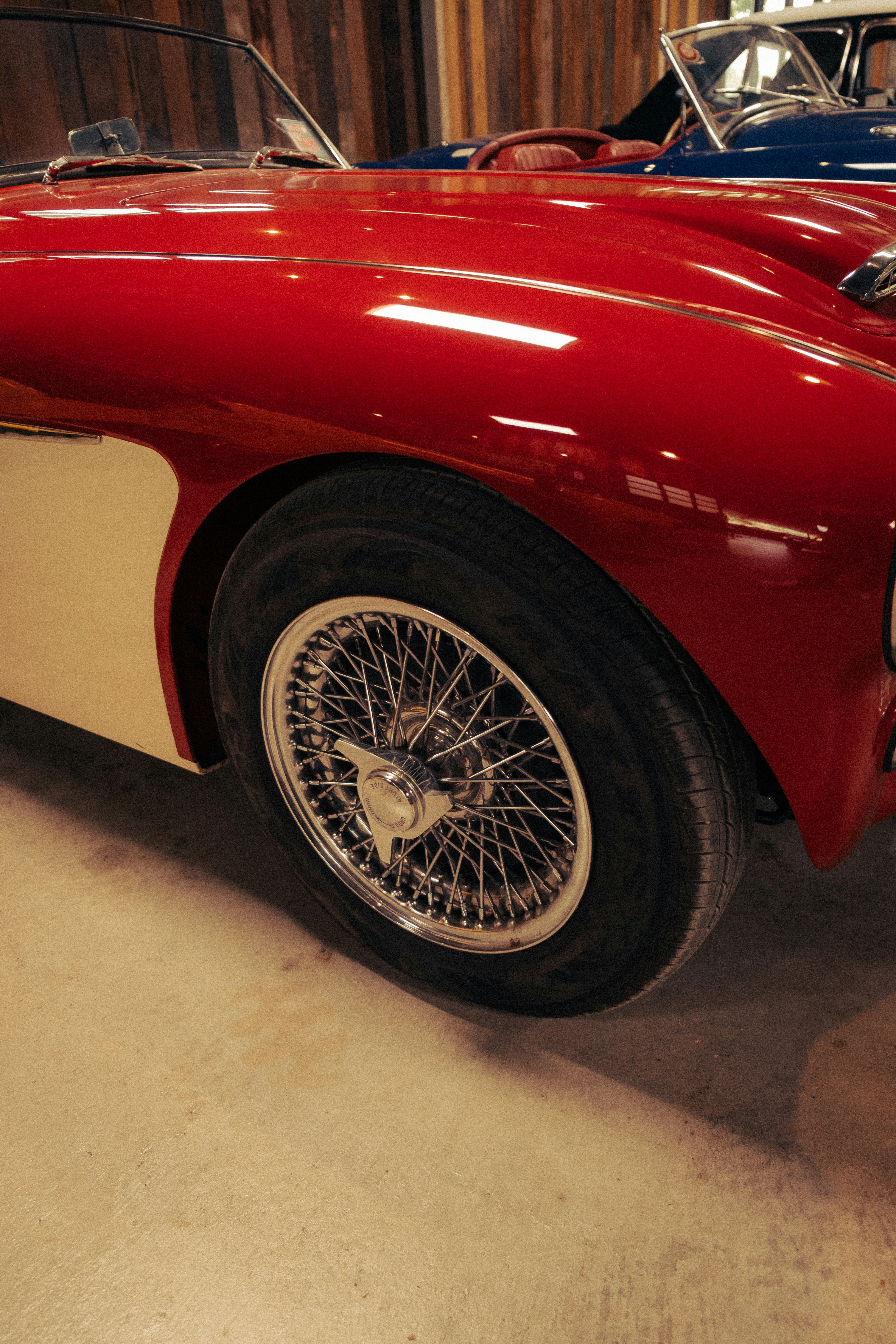 Crimson Curve: Classic Car Body and Spoke Wheel