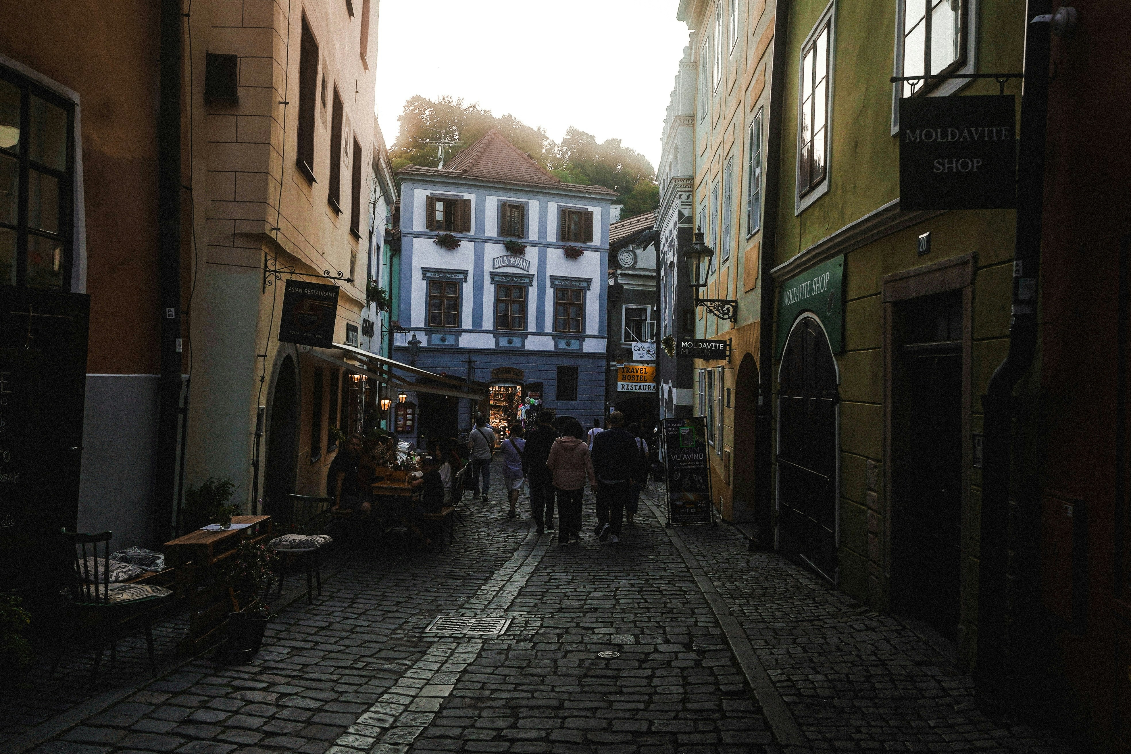 Cobblestone Street Toward a Blue-Faced Square