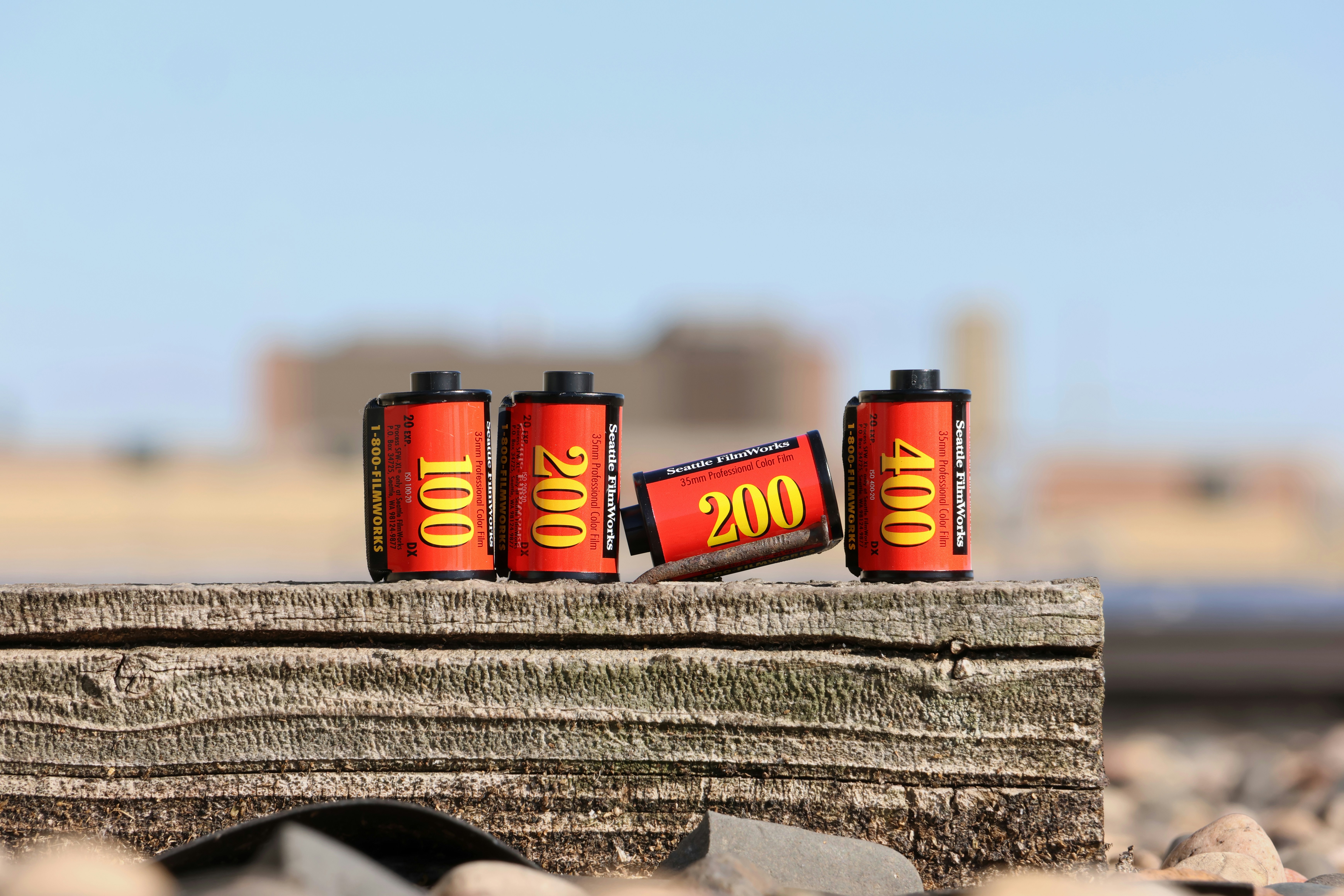 Countdown on a Weathered Plank: Stack of Red-Numbered Film Colders Waiting to Unfold