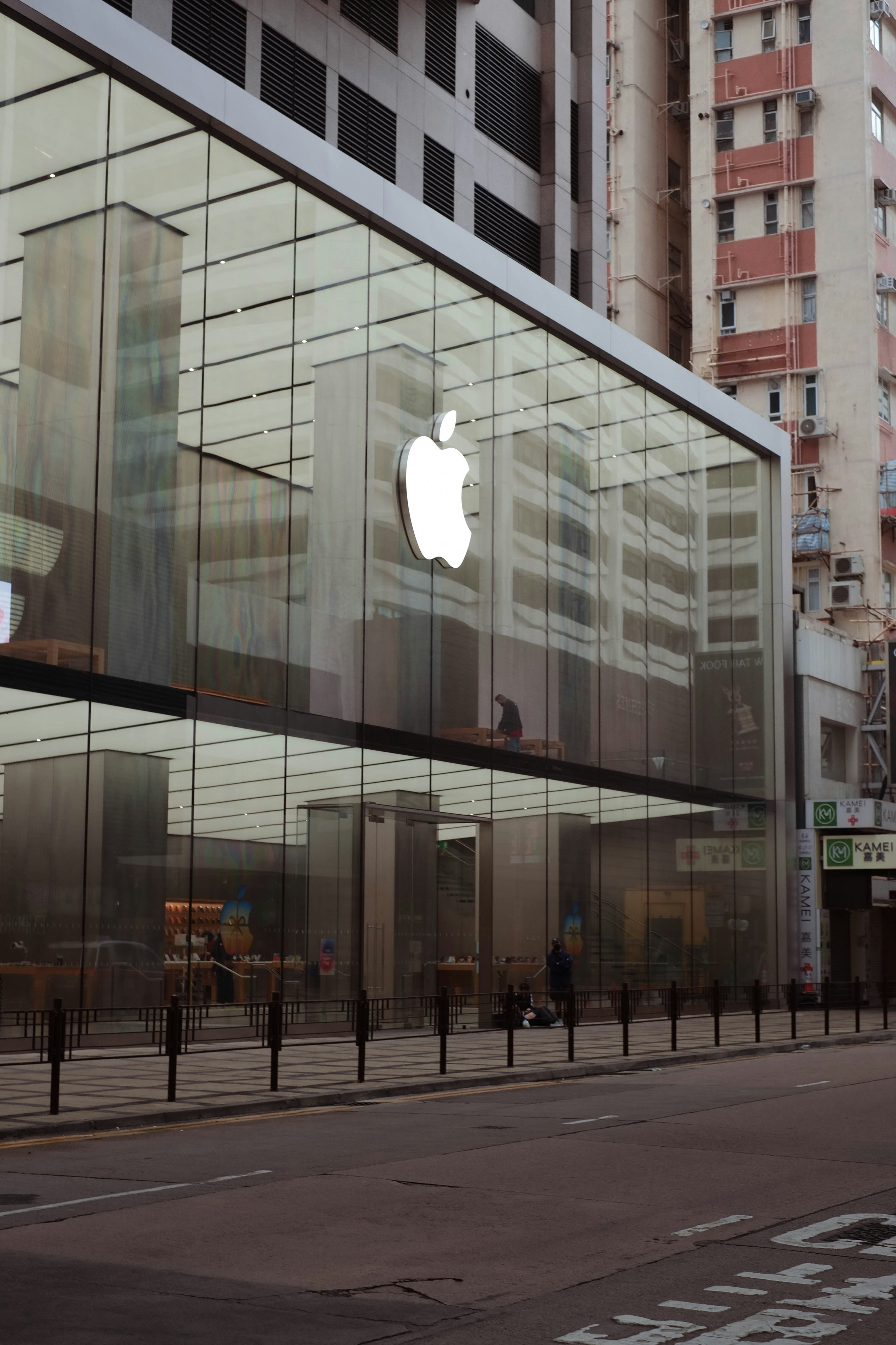 Apple Glass Facade: Quiet Street, Bold Logo