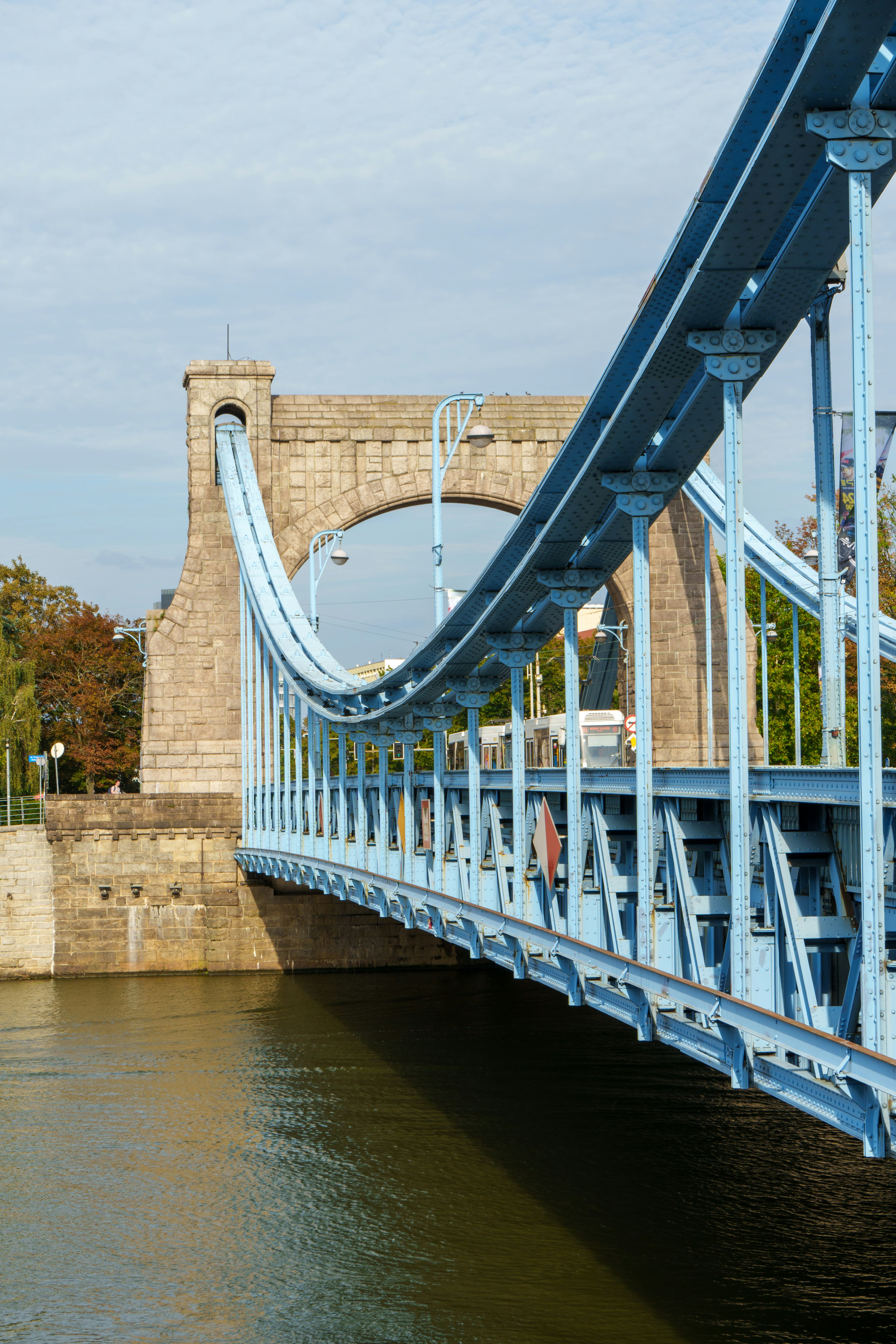 Blue Suspension: A River Bridge Captured in Strong Morning Light