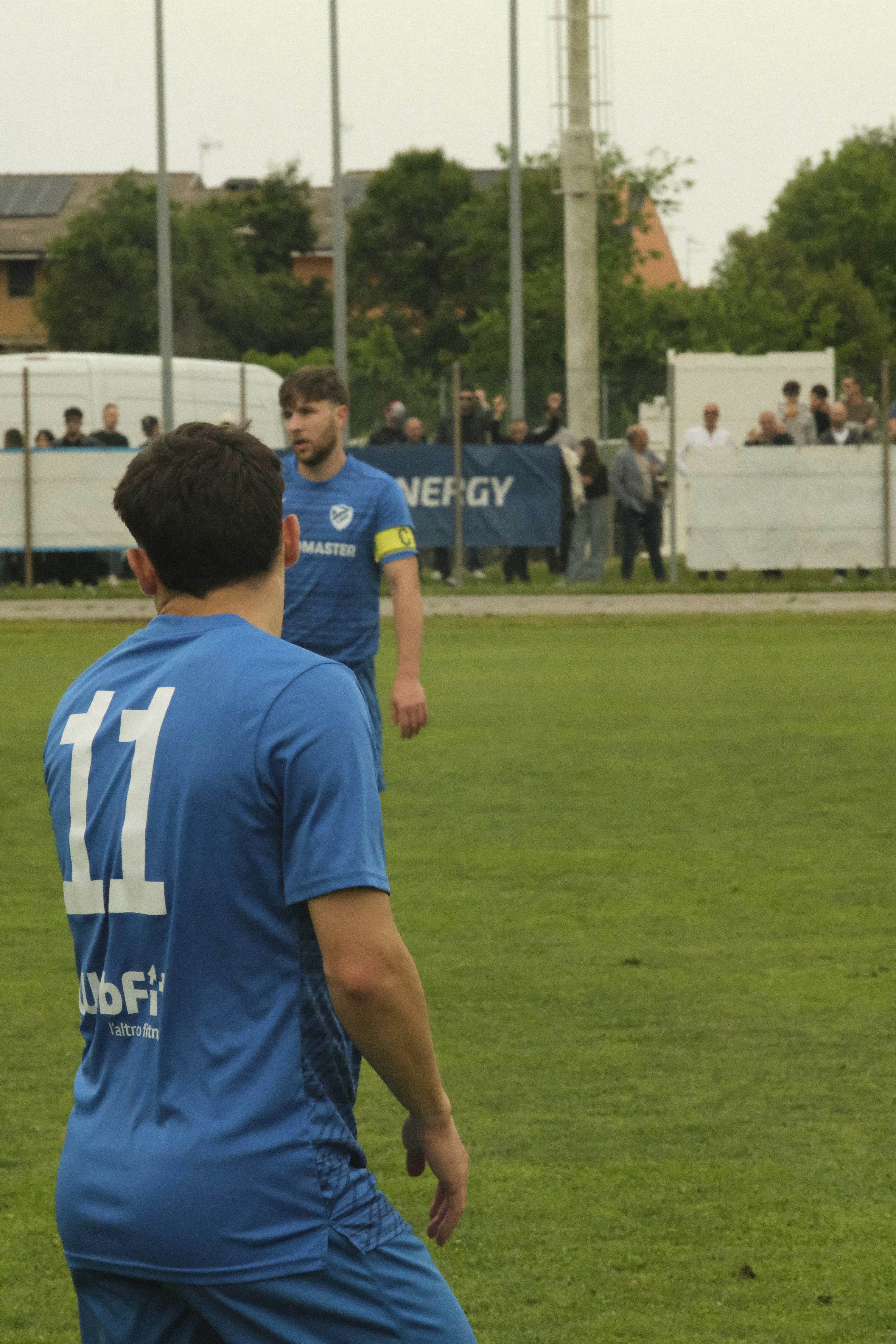 Blue Jersey Countdown: A Moment Between Players on the Field