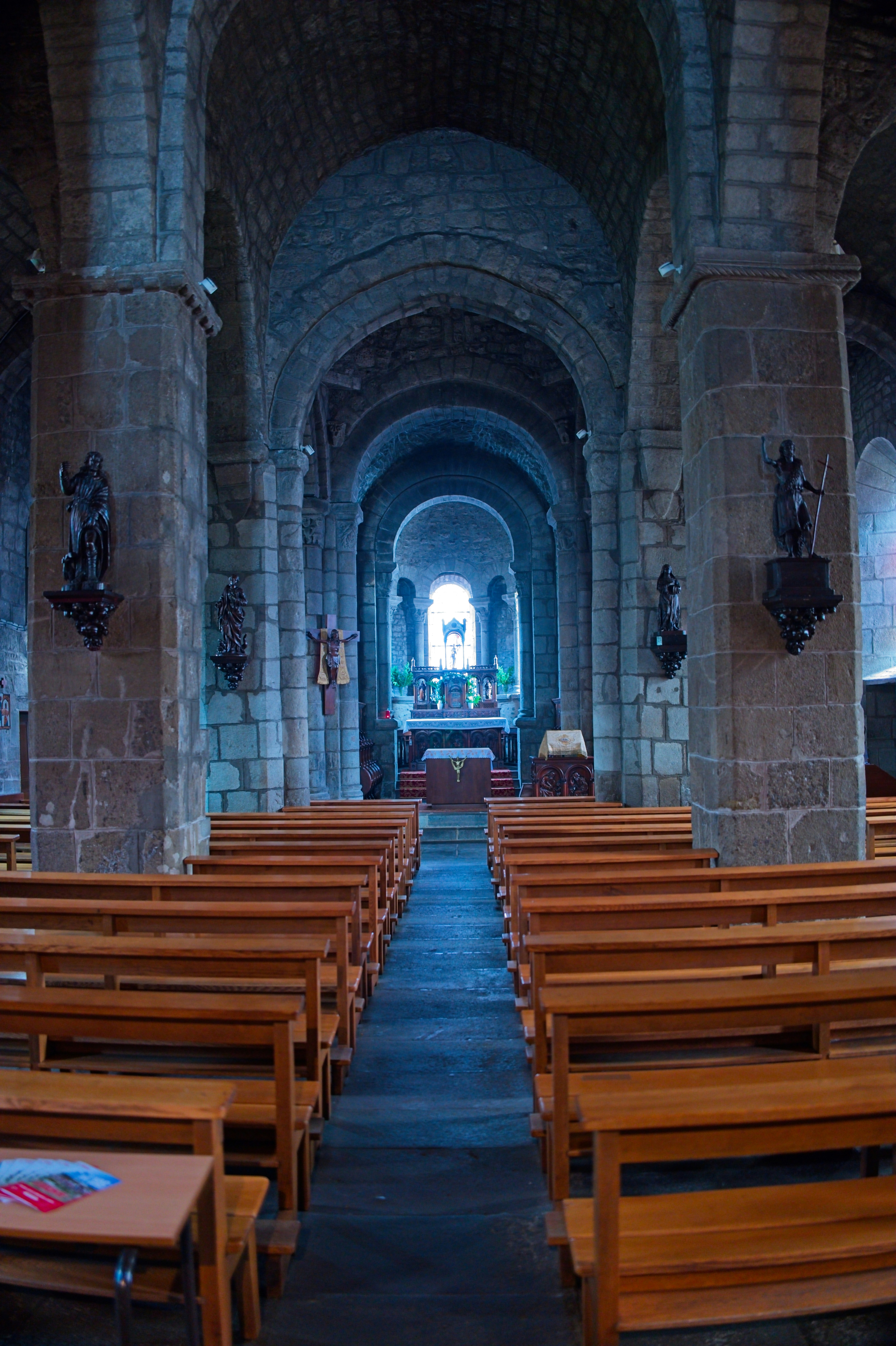 Cathedral Aisle Toward the Altar: Symmetry and Light Through Stone Arches