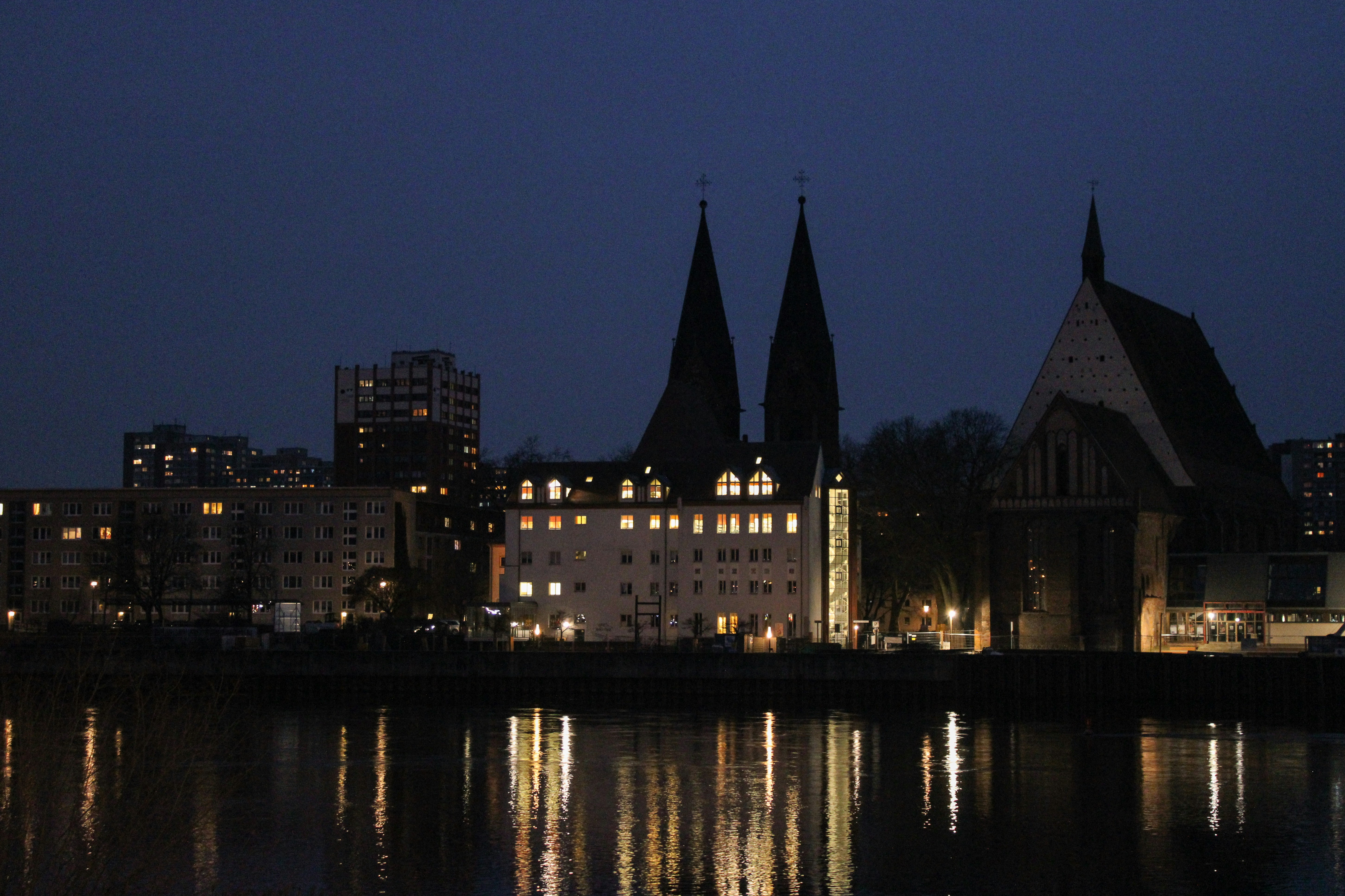 Twin Spires at Dusk: City Lights Reflecting on the Rhine