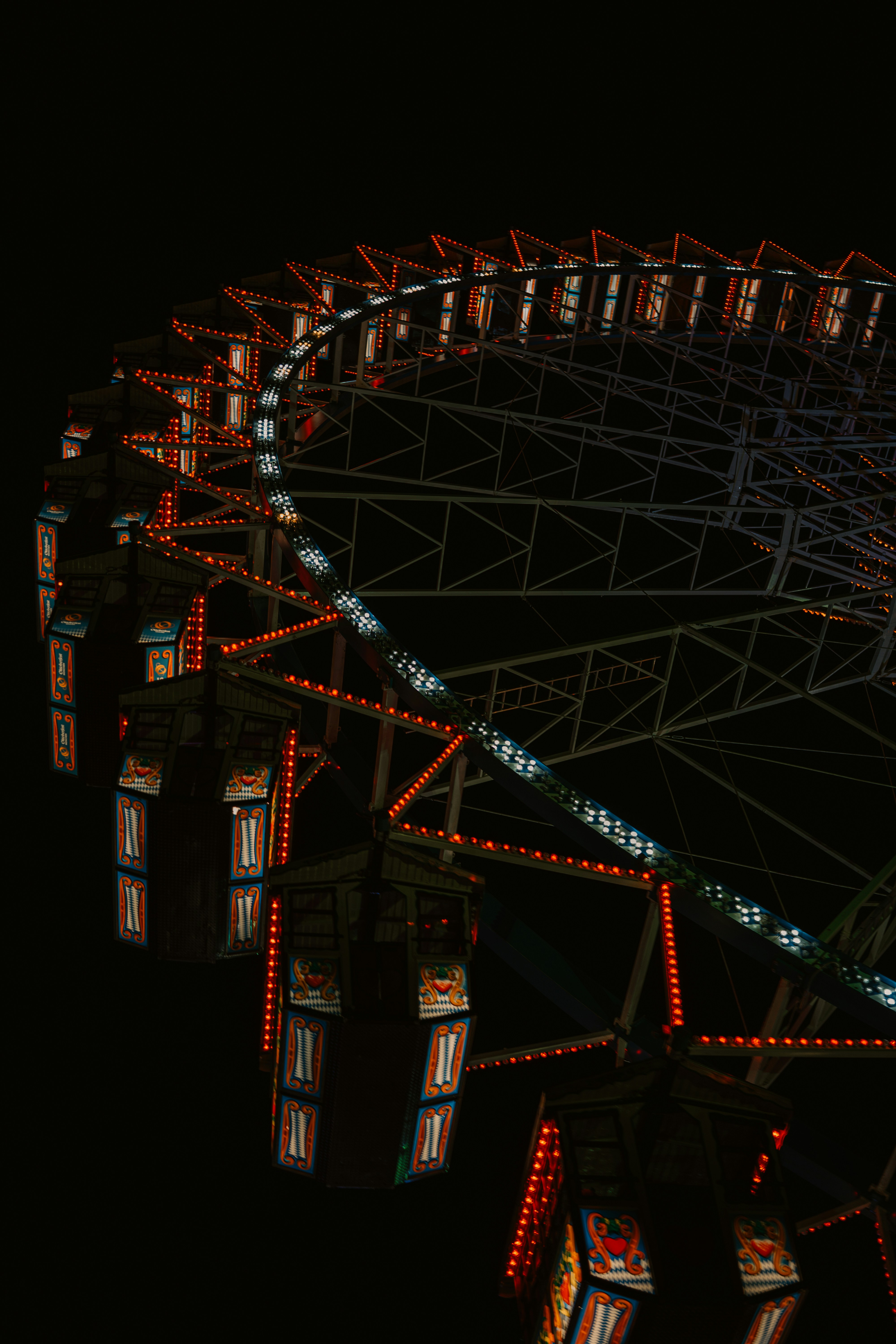Neon Ferris Wheel Halo in the Night