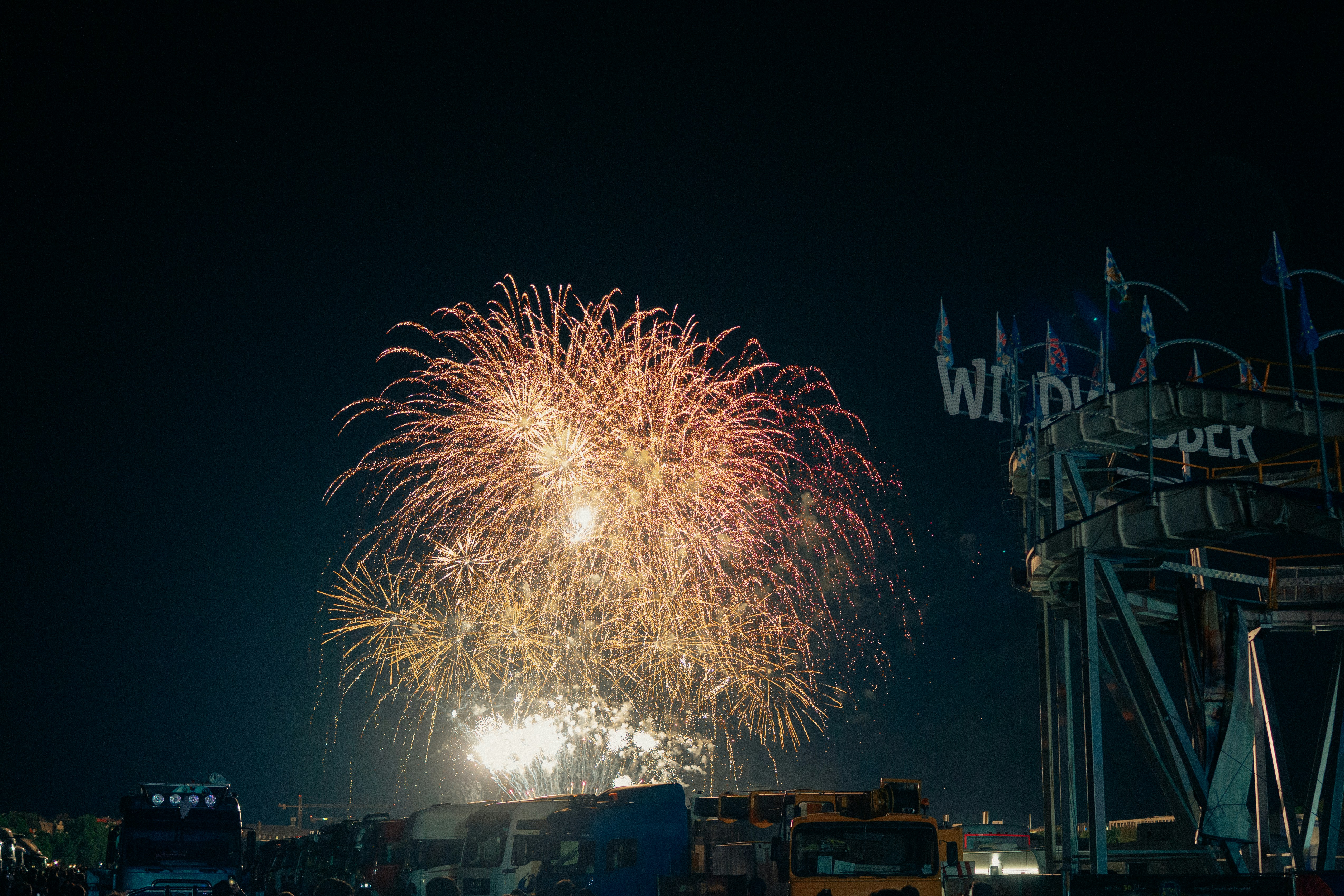 Fireworks explode in the night sky over a crowd. photo – Free Night sky ...