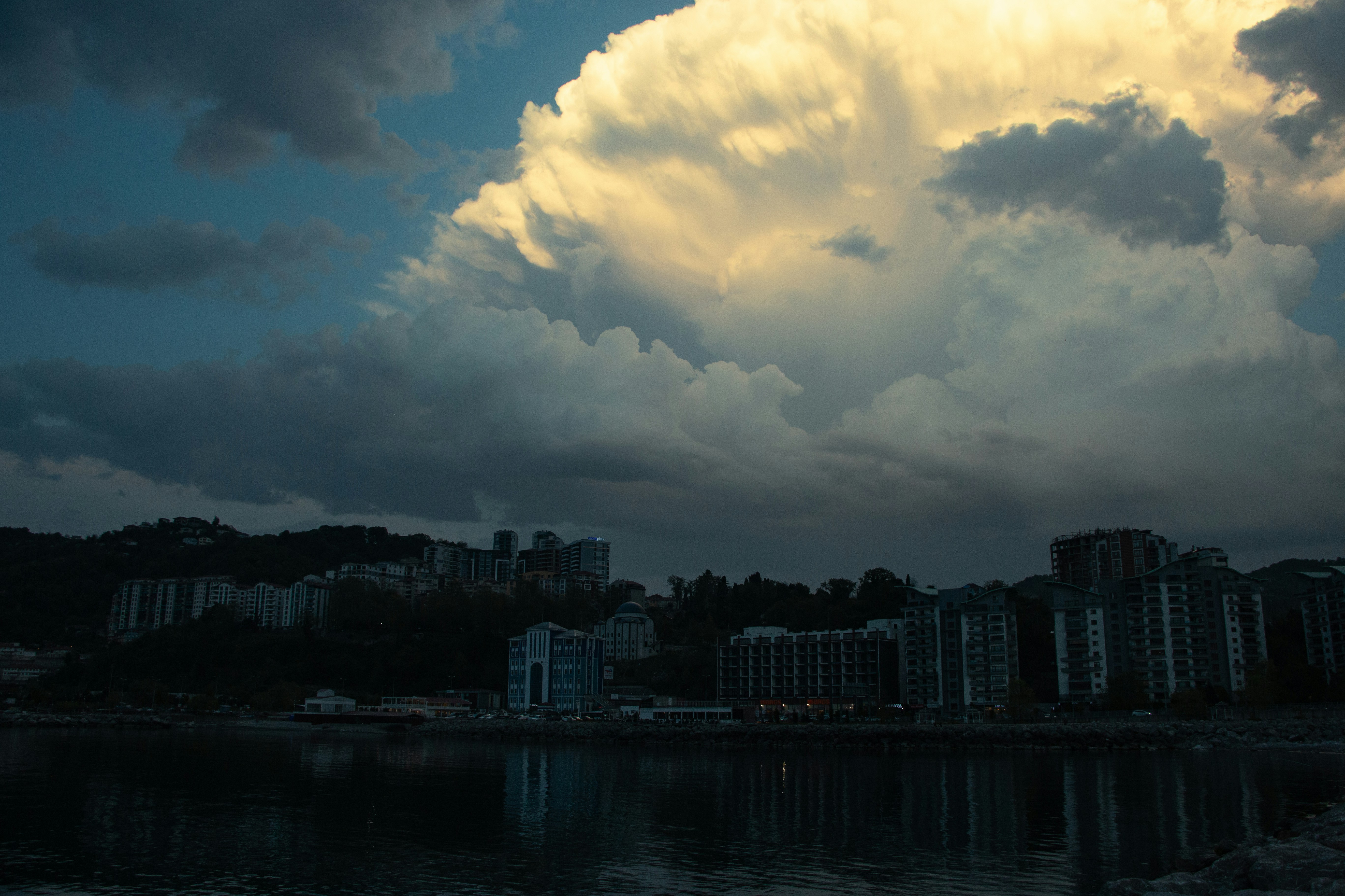 Evening Clouds Over a Quiet Waterfront City
