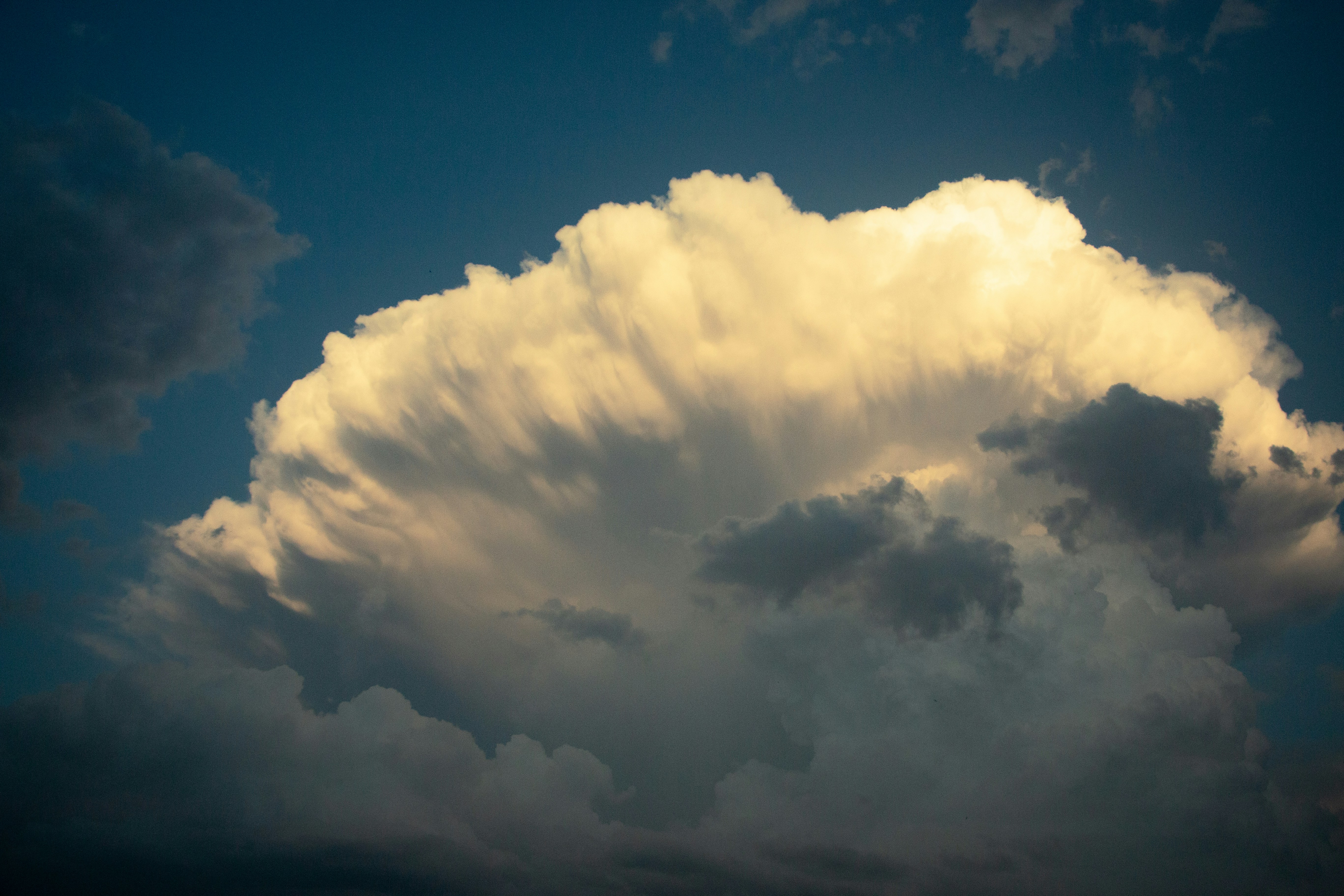 Cloud Sovereign: Sunlit Crest Over Quiet Horizon