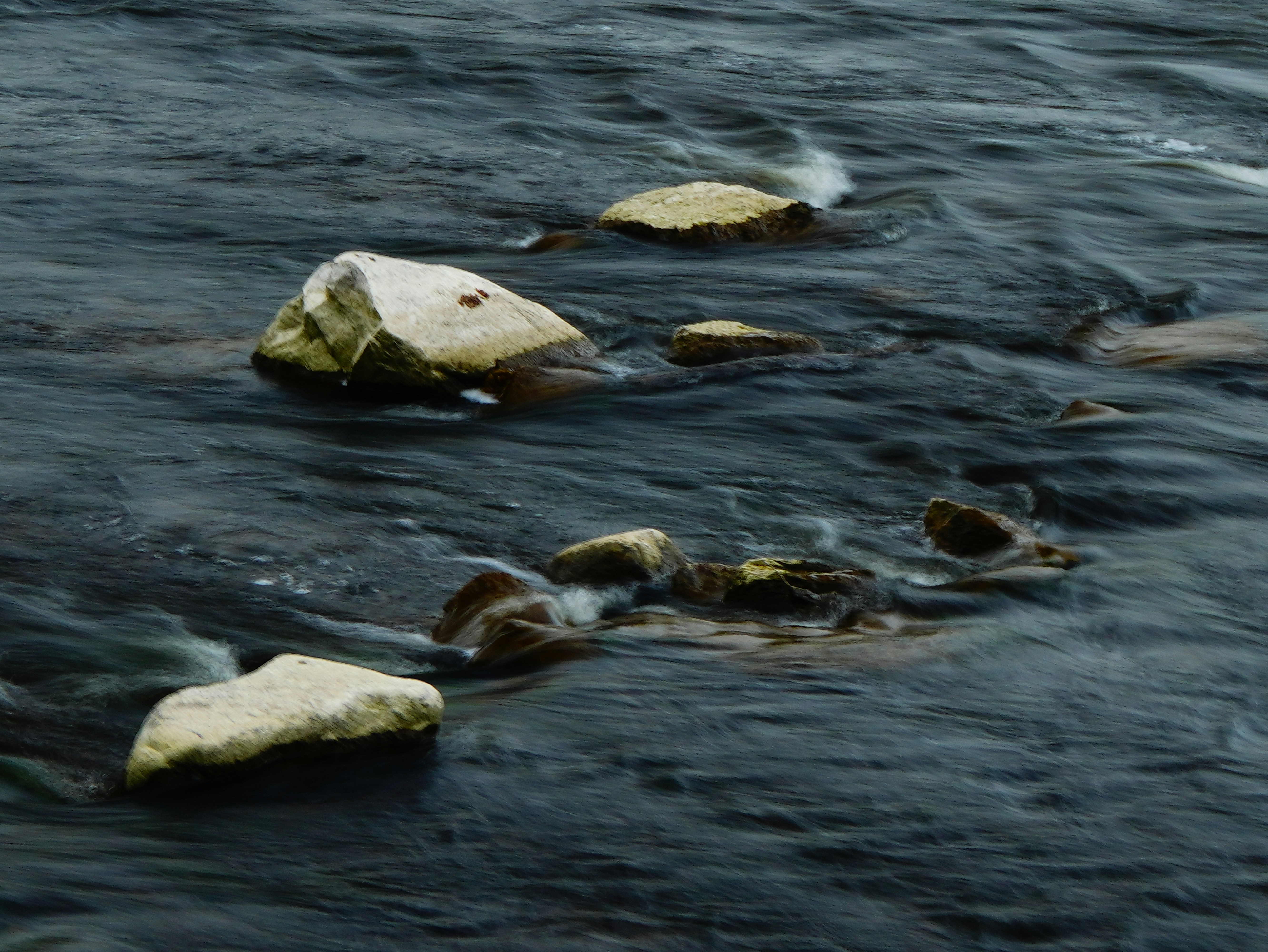 Pebble Cascade: Quiet Stones in Moving Water