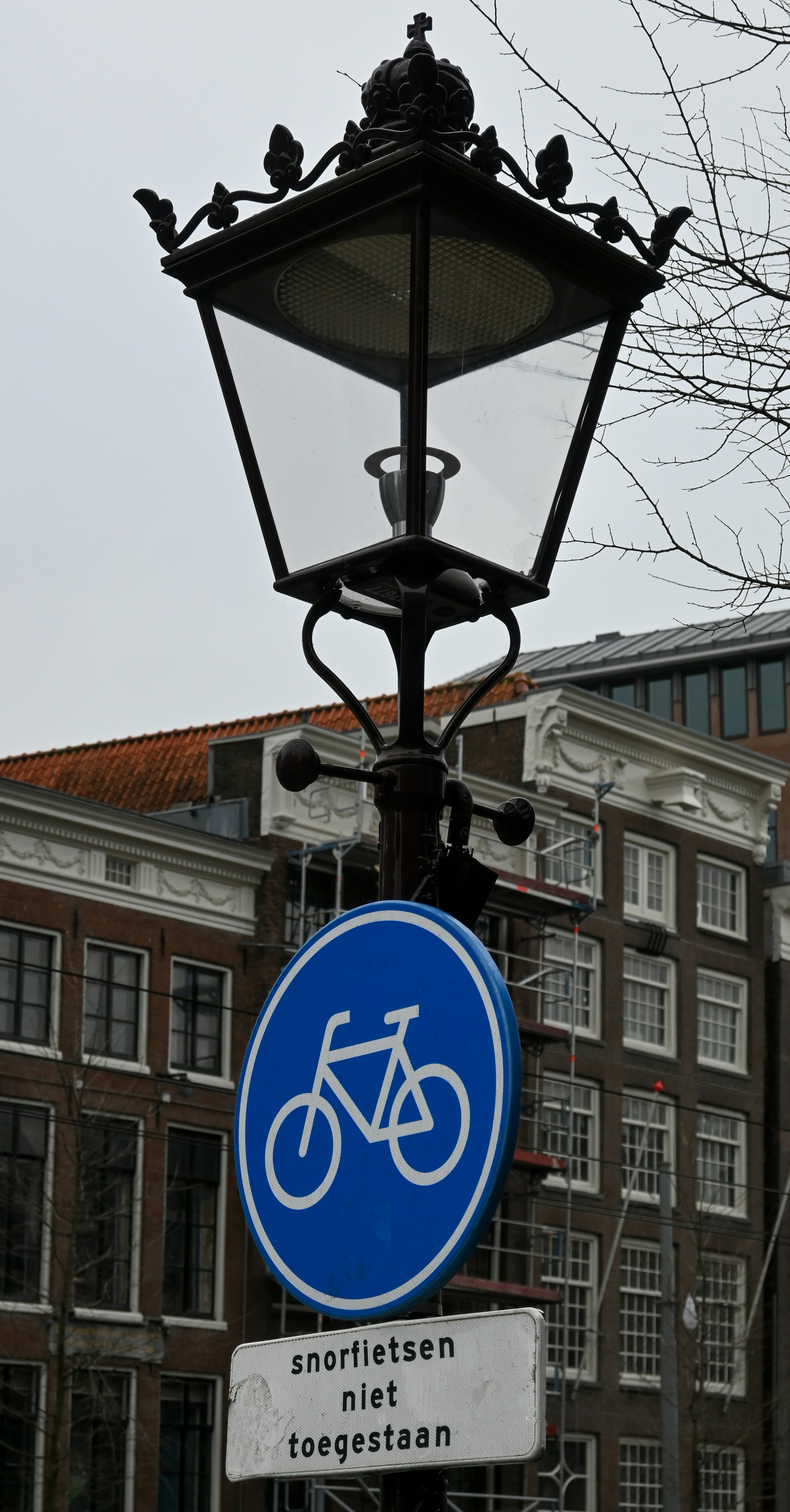 Urban Lantern and Bicycle Sign: A Quiet Street Portrait