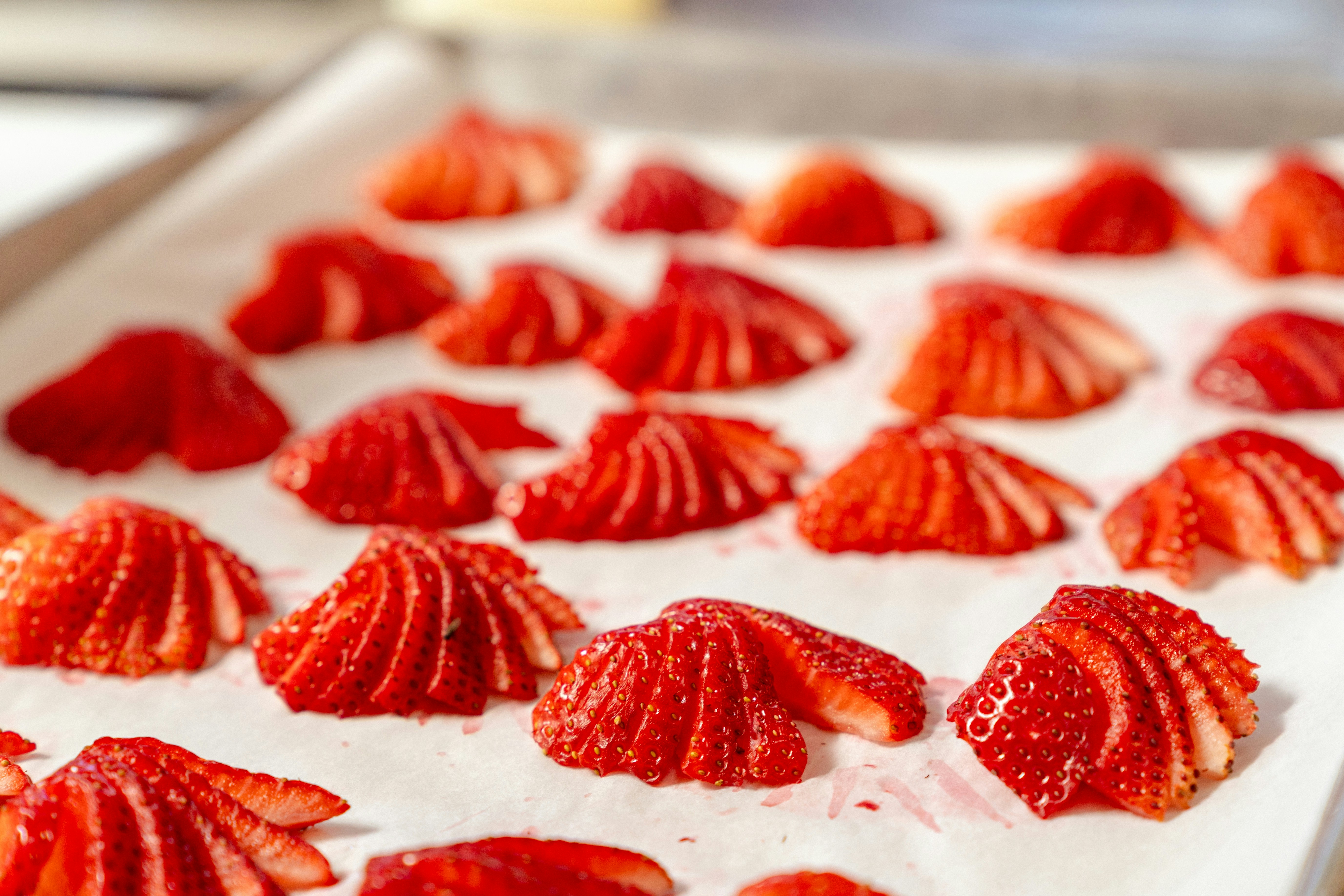 Scarlet Ridges: A Tray of Strawberry Petals Ready for the Oven