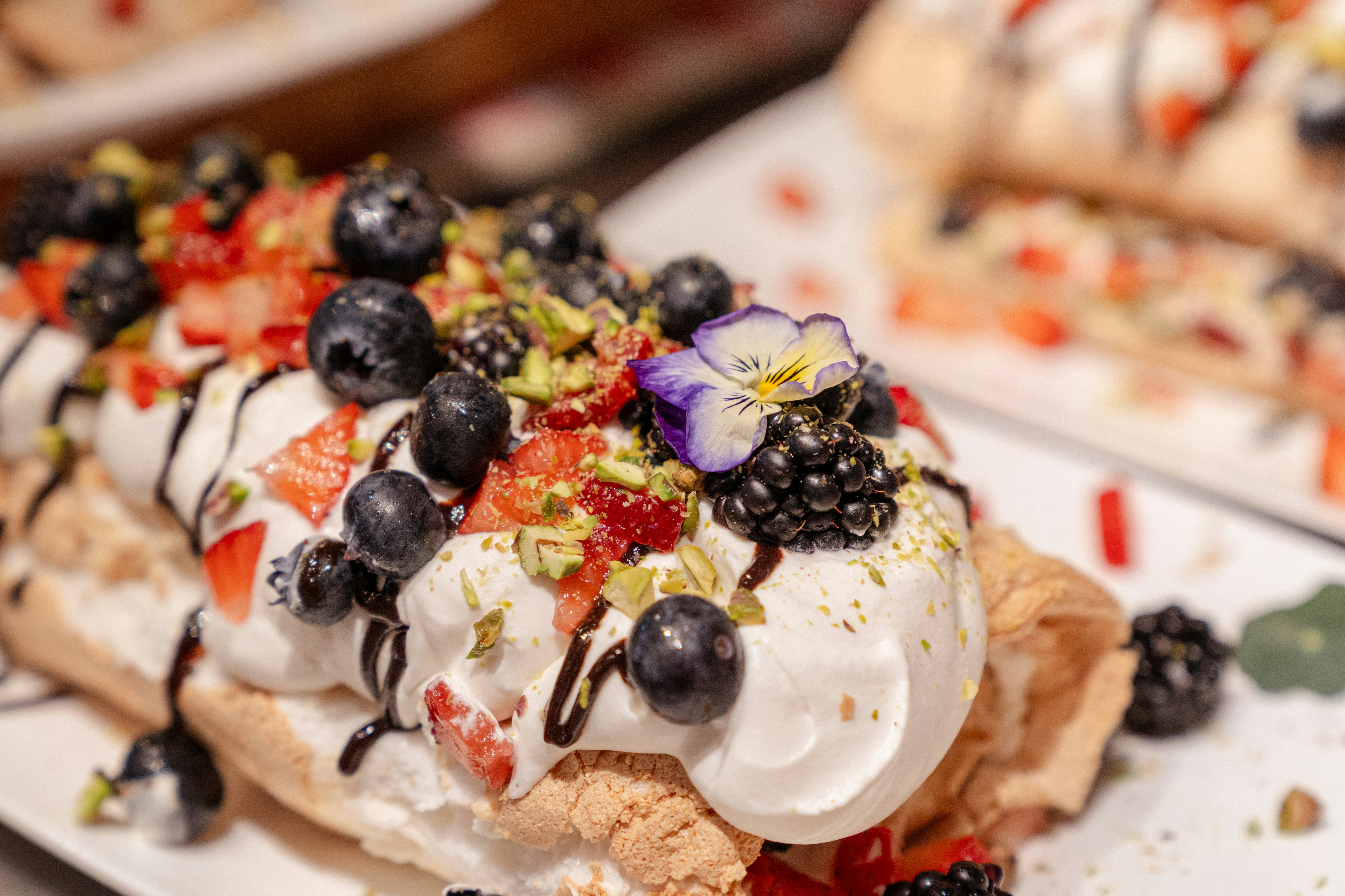 Creamed Delight: A Bloom of Berries on a Crispy Pastry