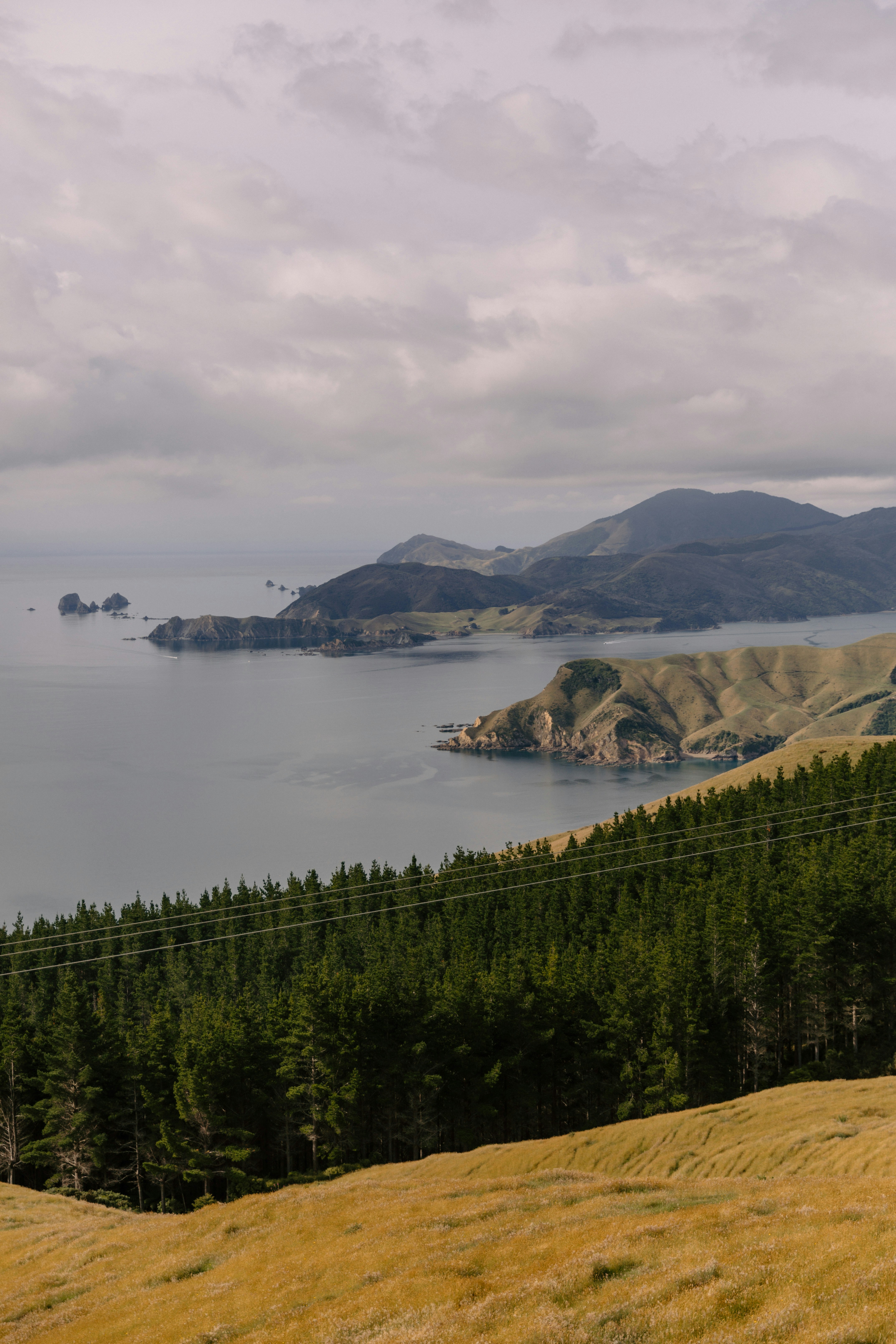 Coastal Ridge under Clouded Sky