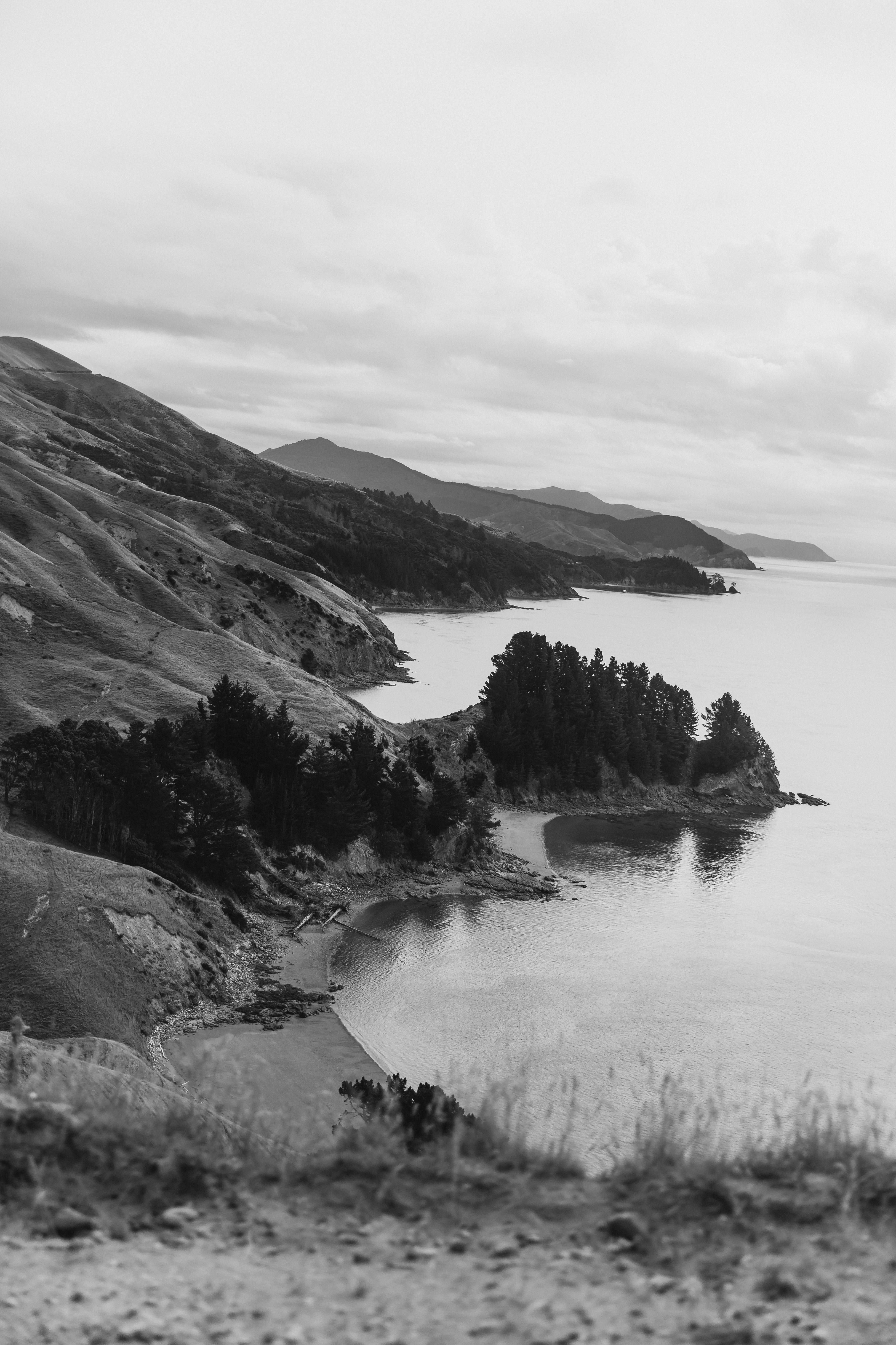 Coastal Cliffs and Cove in Monochrome Calm