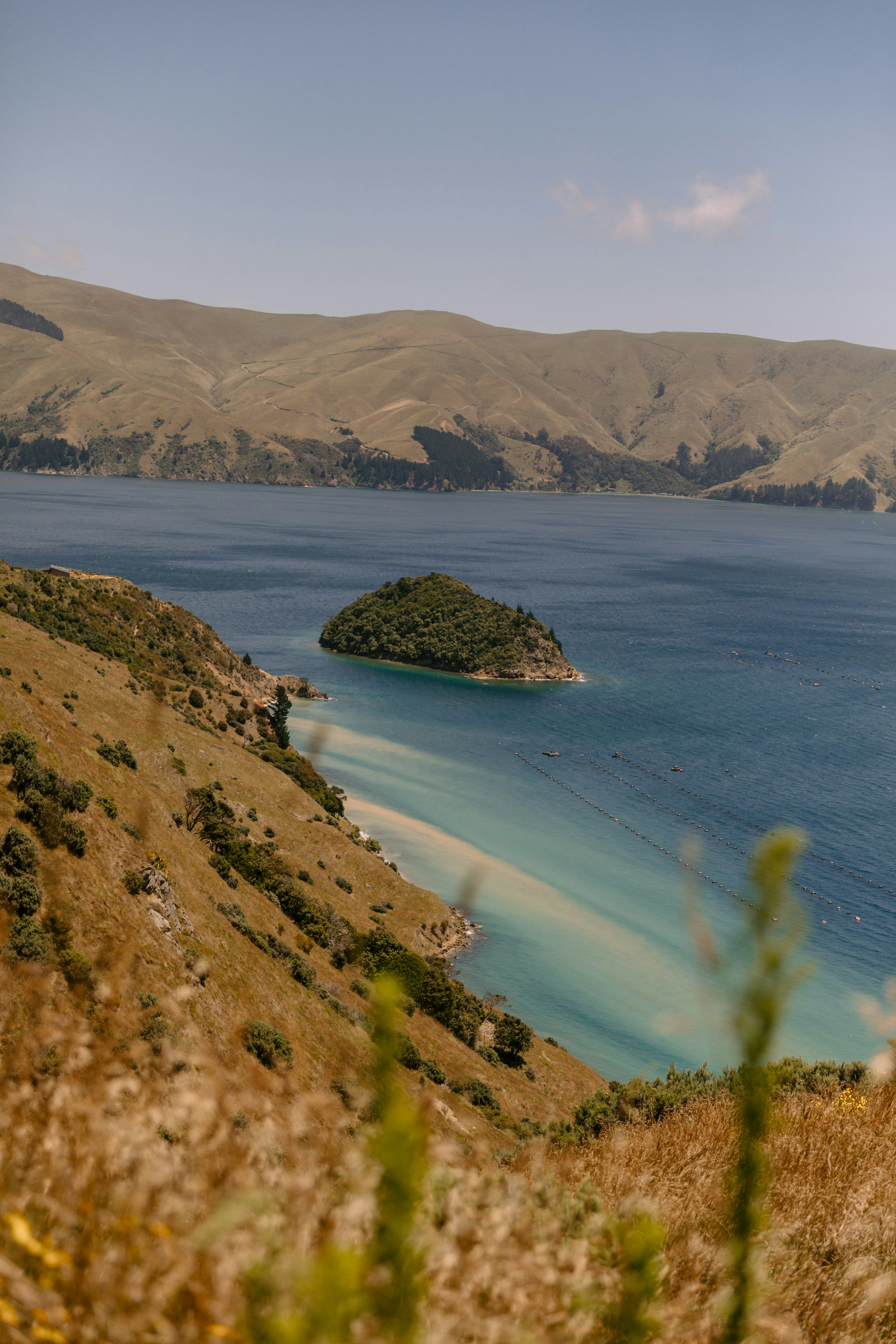 Azure Lagoon Island Crowned by Golden Hills