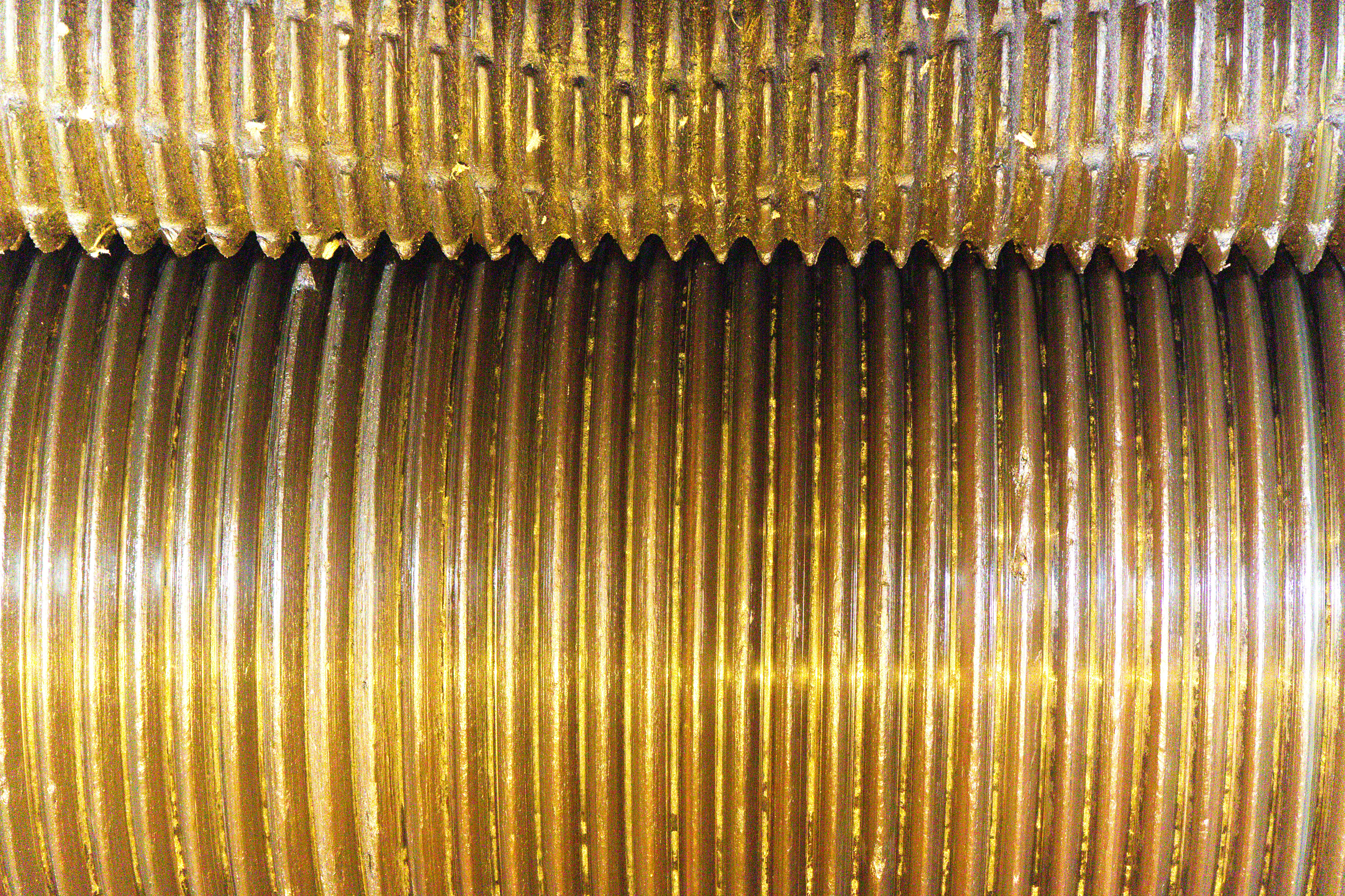 Metal Threads: A Close-Up of Coiled Brass Synchronization