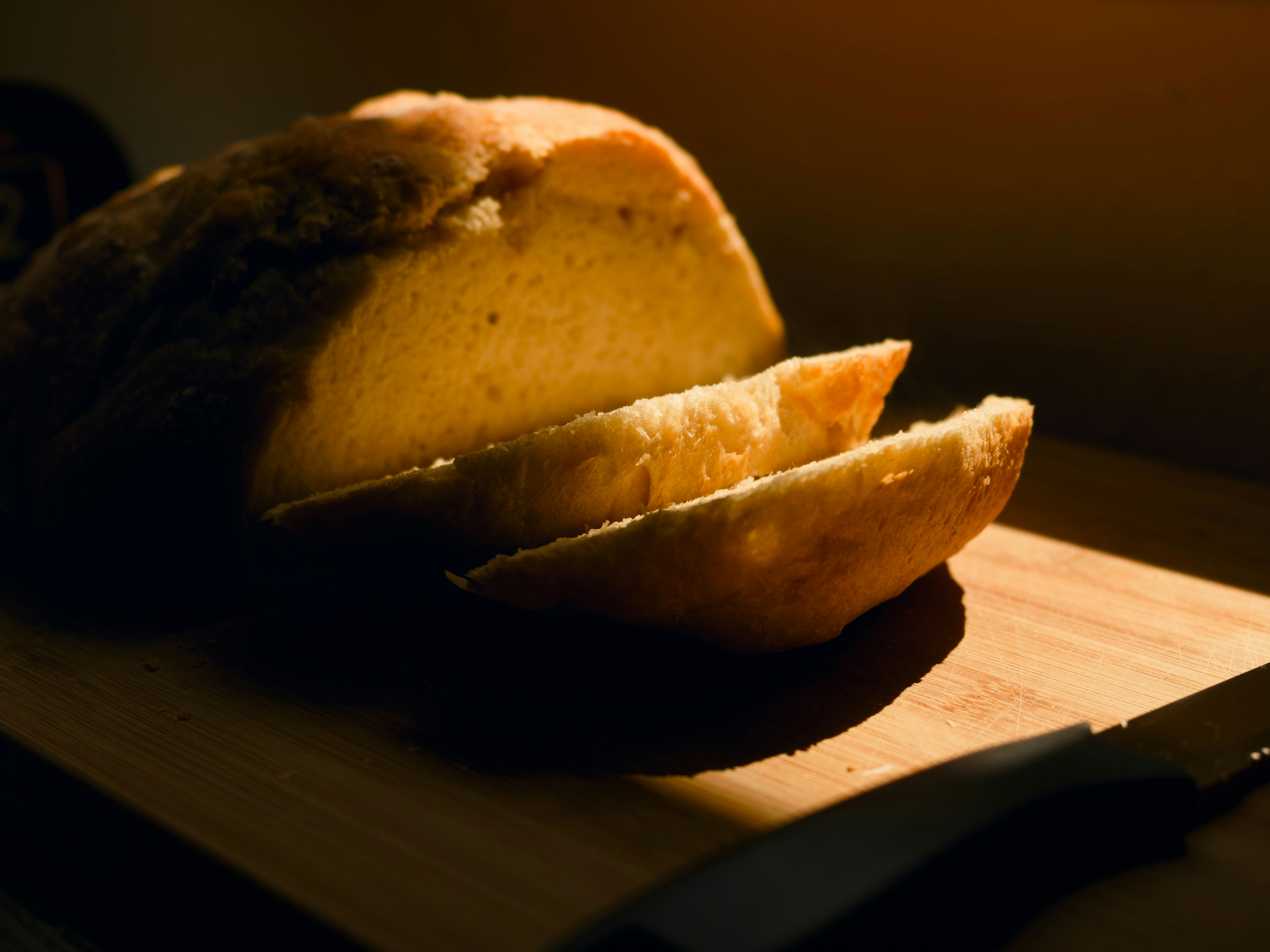 Sliver of Crust: Morning Light on Sliced Loaf