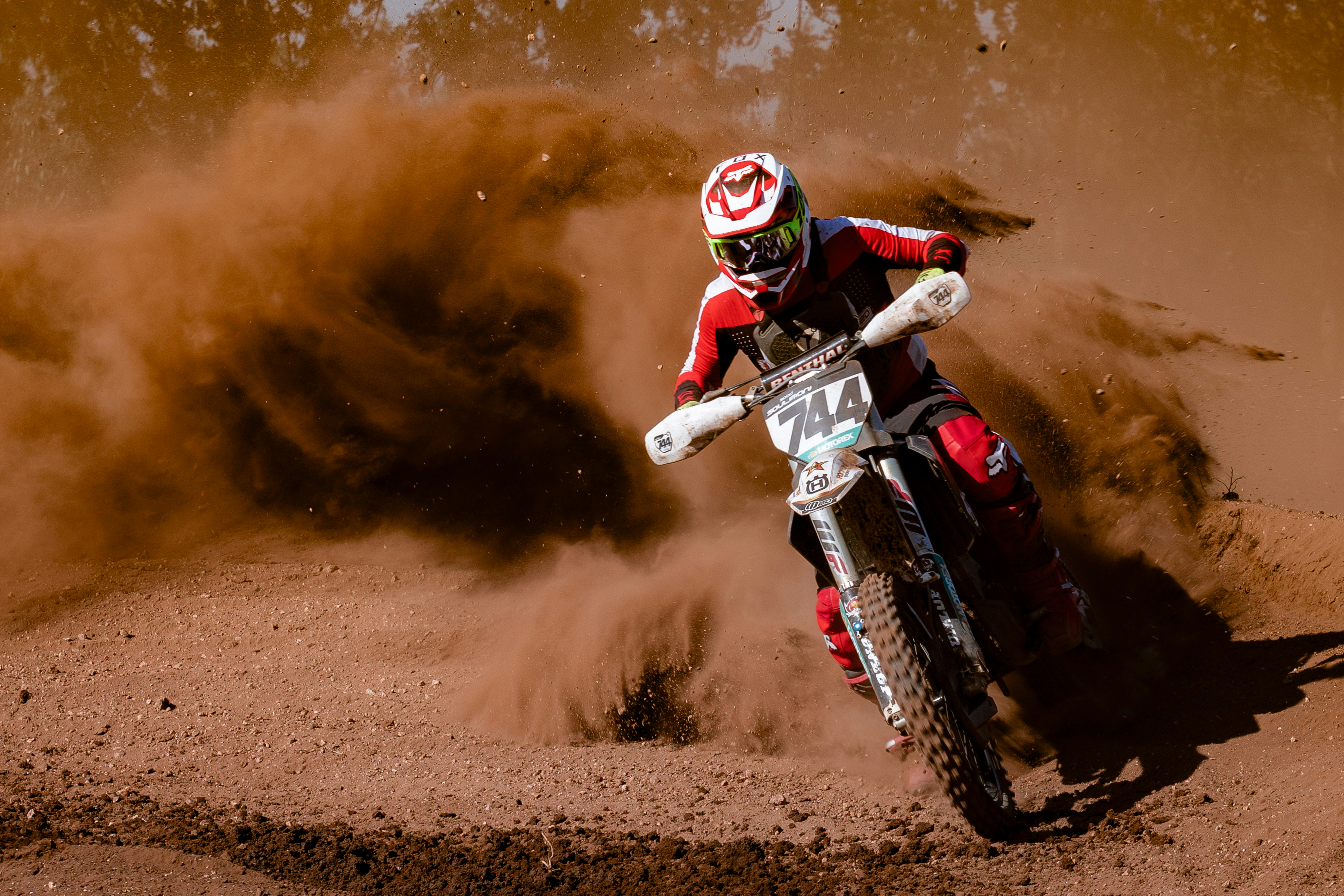 Dust Cloud Sprint: Racer Punctuates the Turn