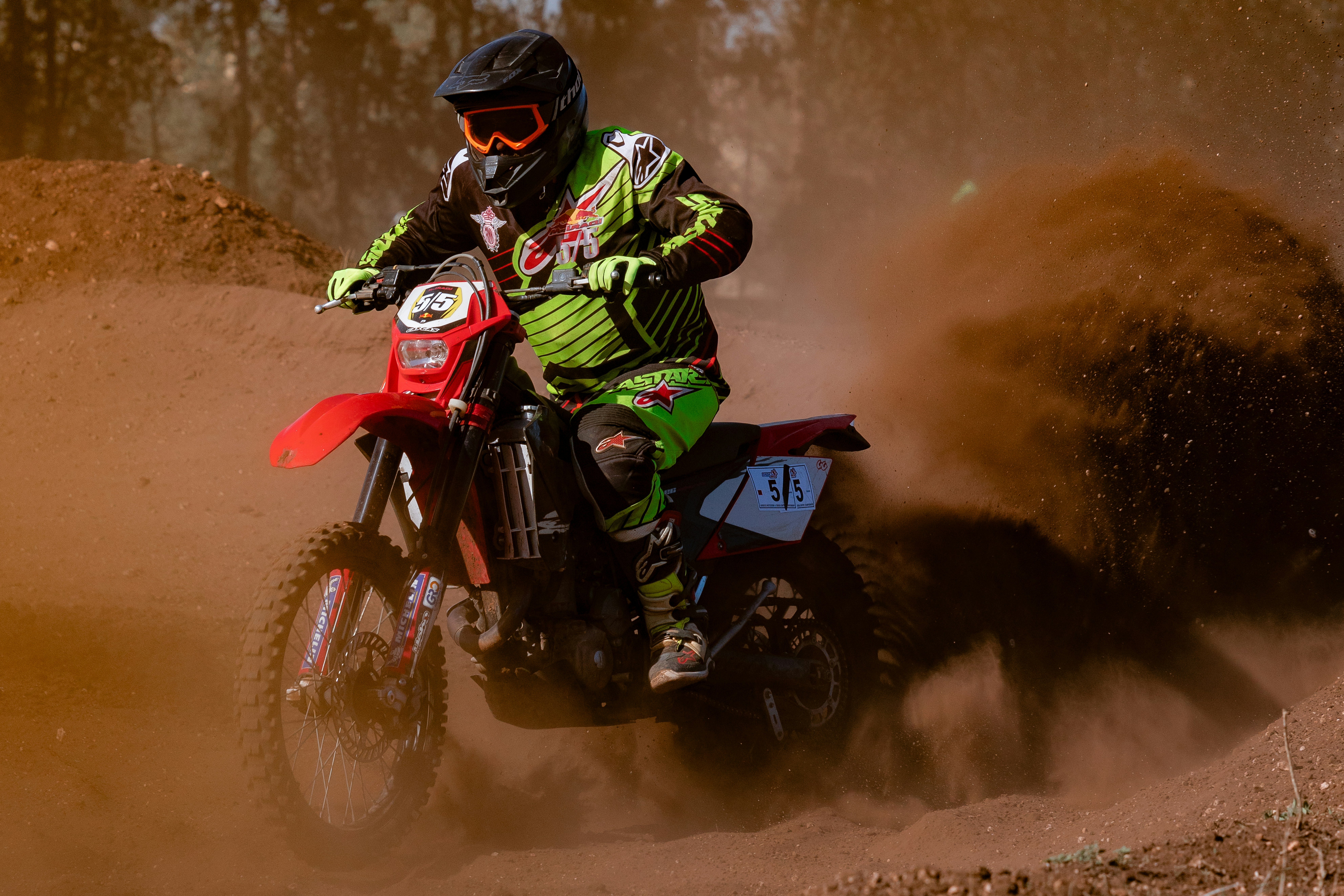 Dust and Drive: A Motocross Burst Through Reddish Earth
